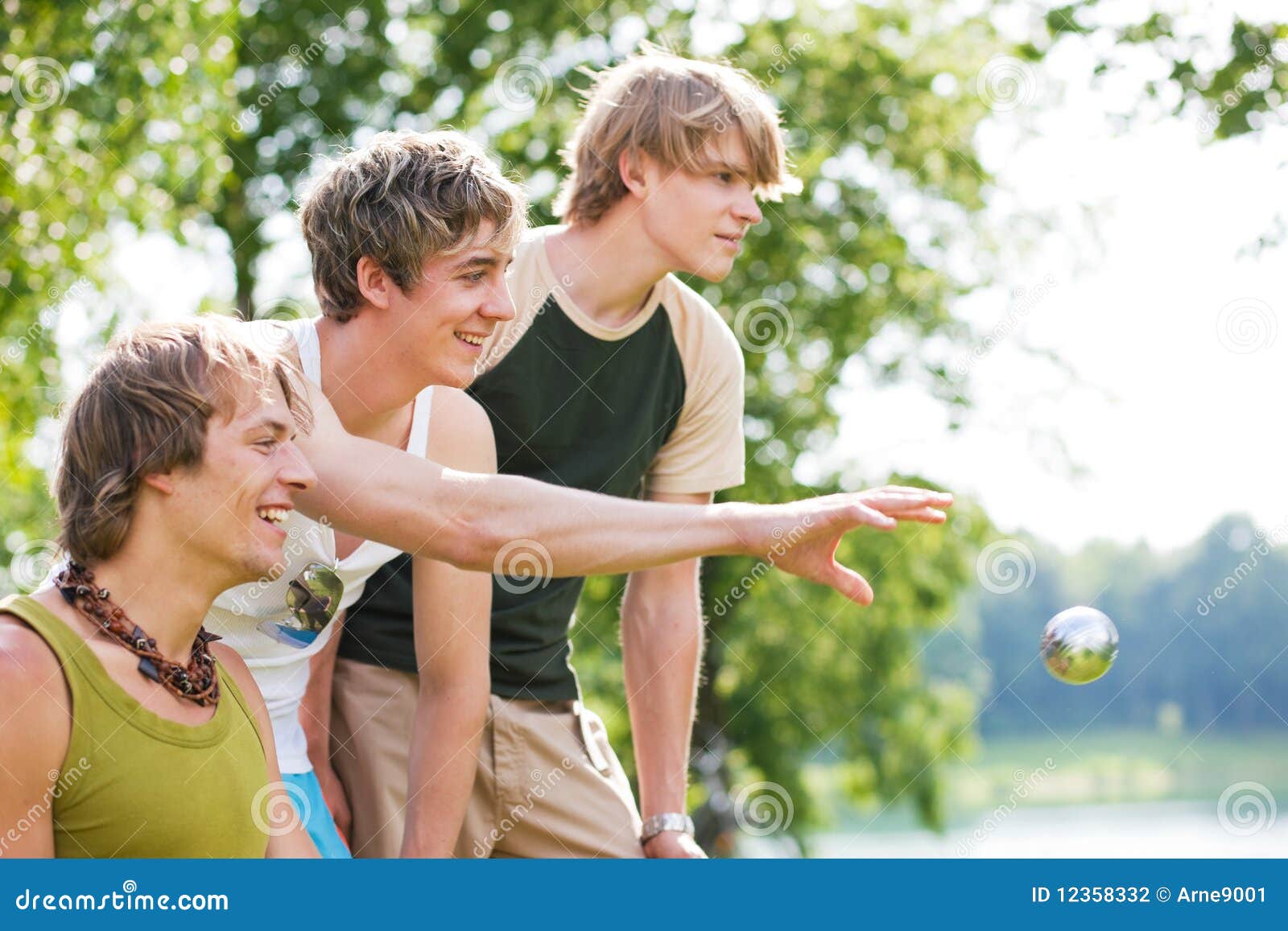 Friends playing boule stock photo. Image of lawn, throwing - 12358332