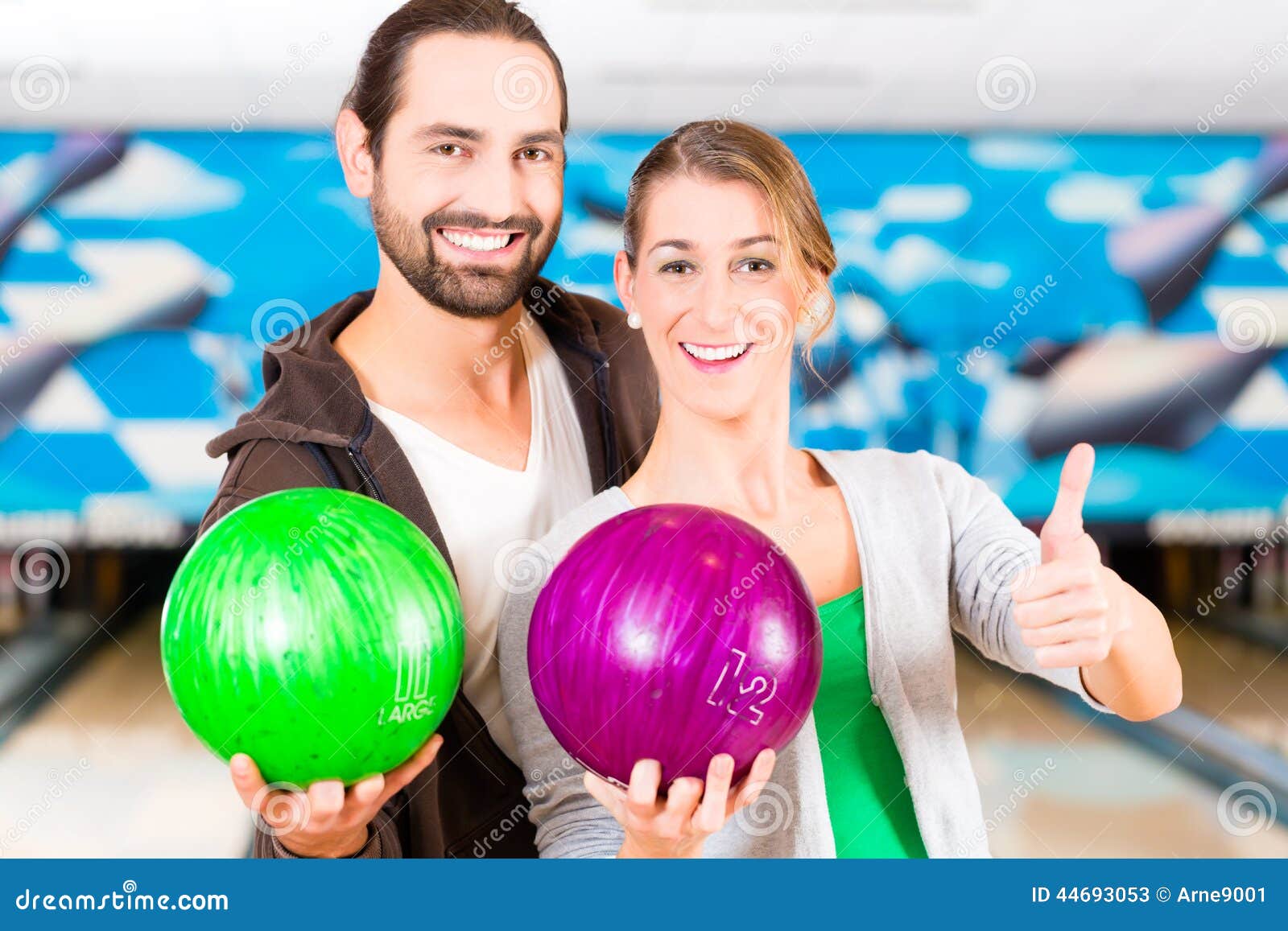 Friends playing Bowling stock image. Image of active - 44693053