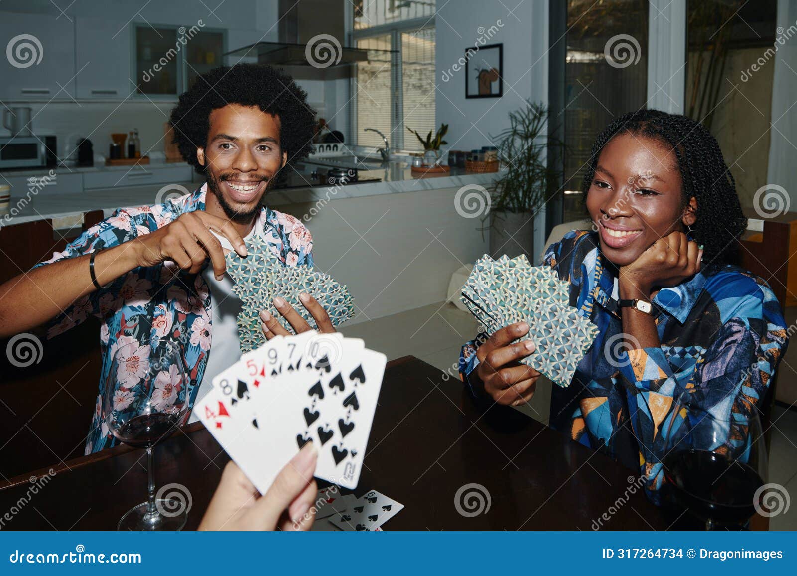 Friends Playing Cards at Home Stock Photo - Image of people, happy ...