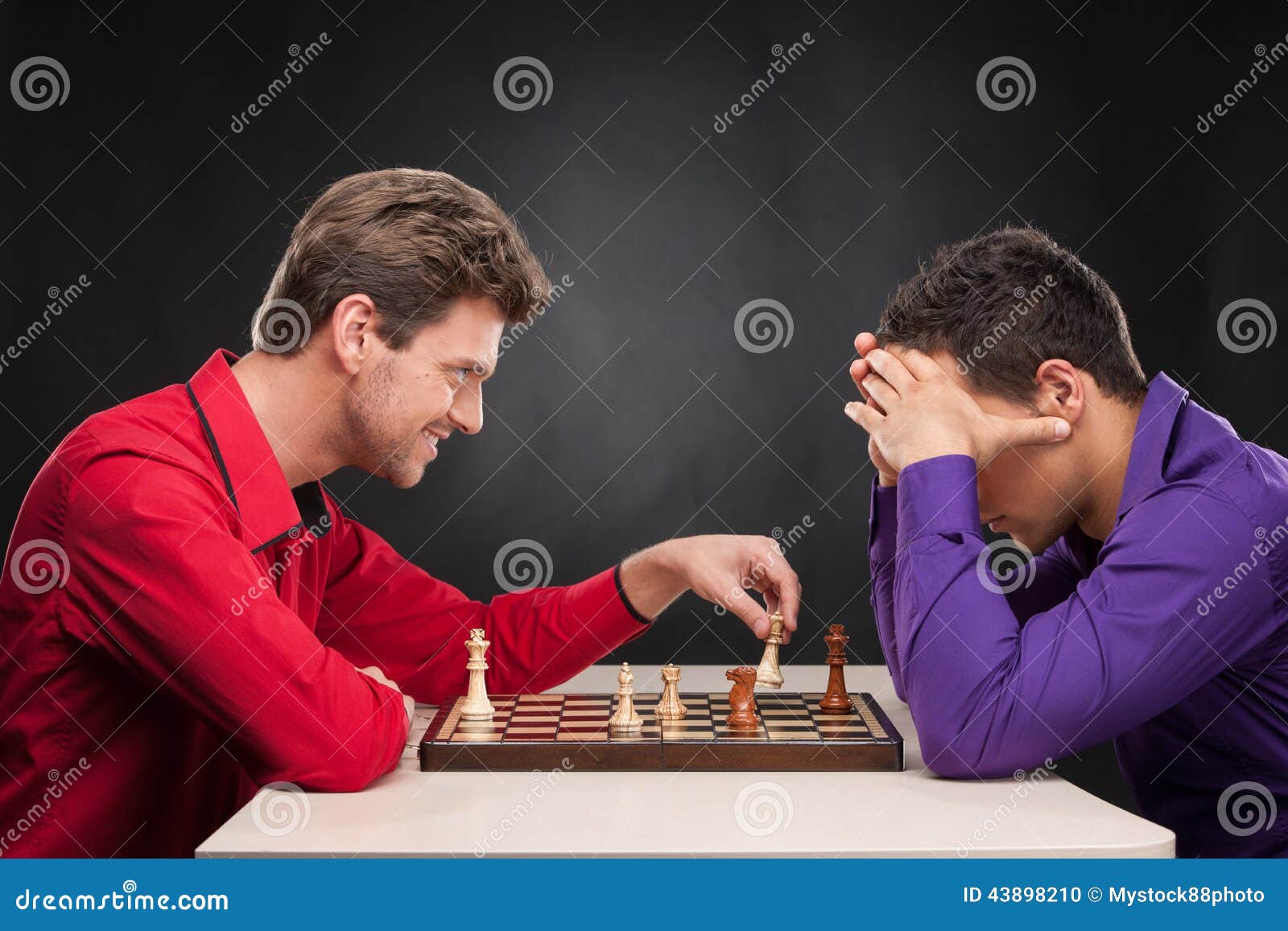 Friends Playing Chess on Black Background. Stock Photo - Image of ...