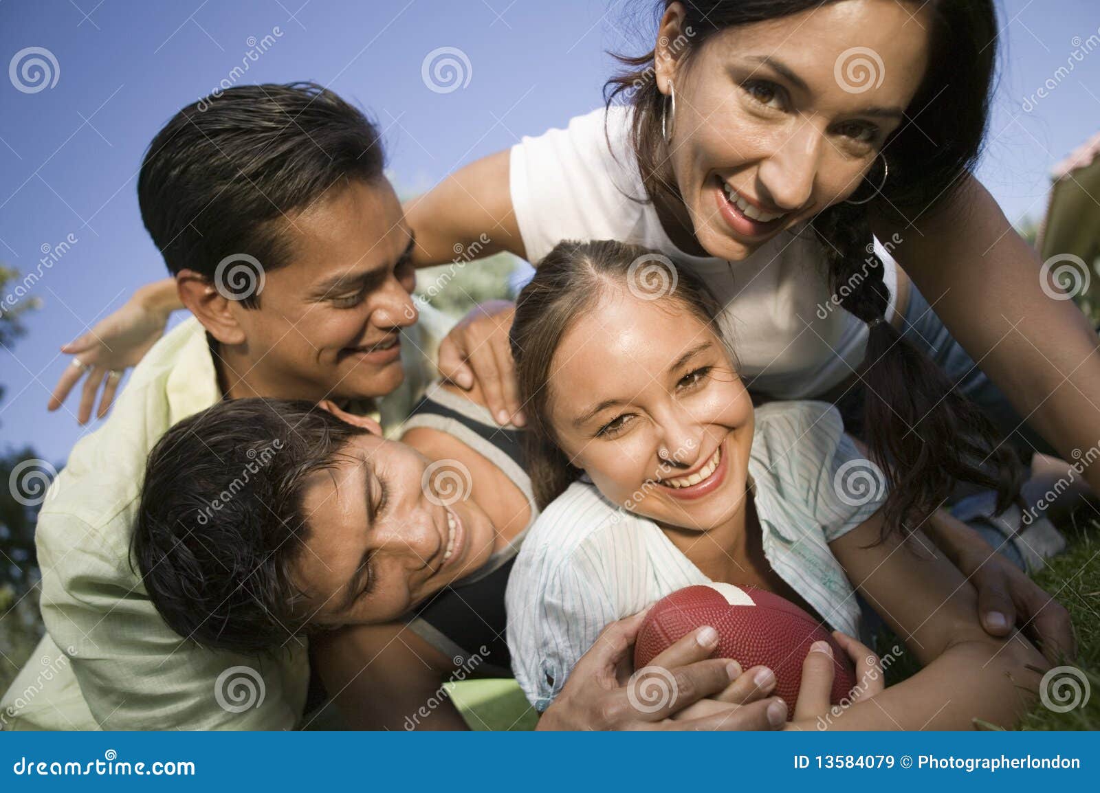 Friends playing football stock image. Image of woman - 13584079