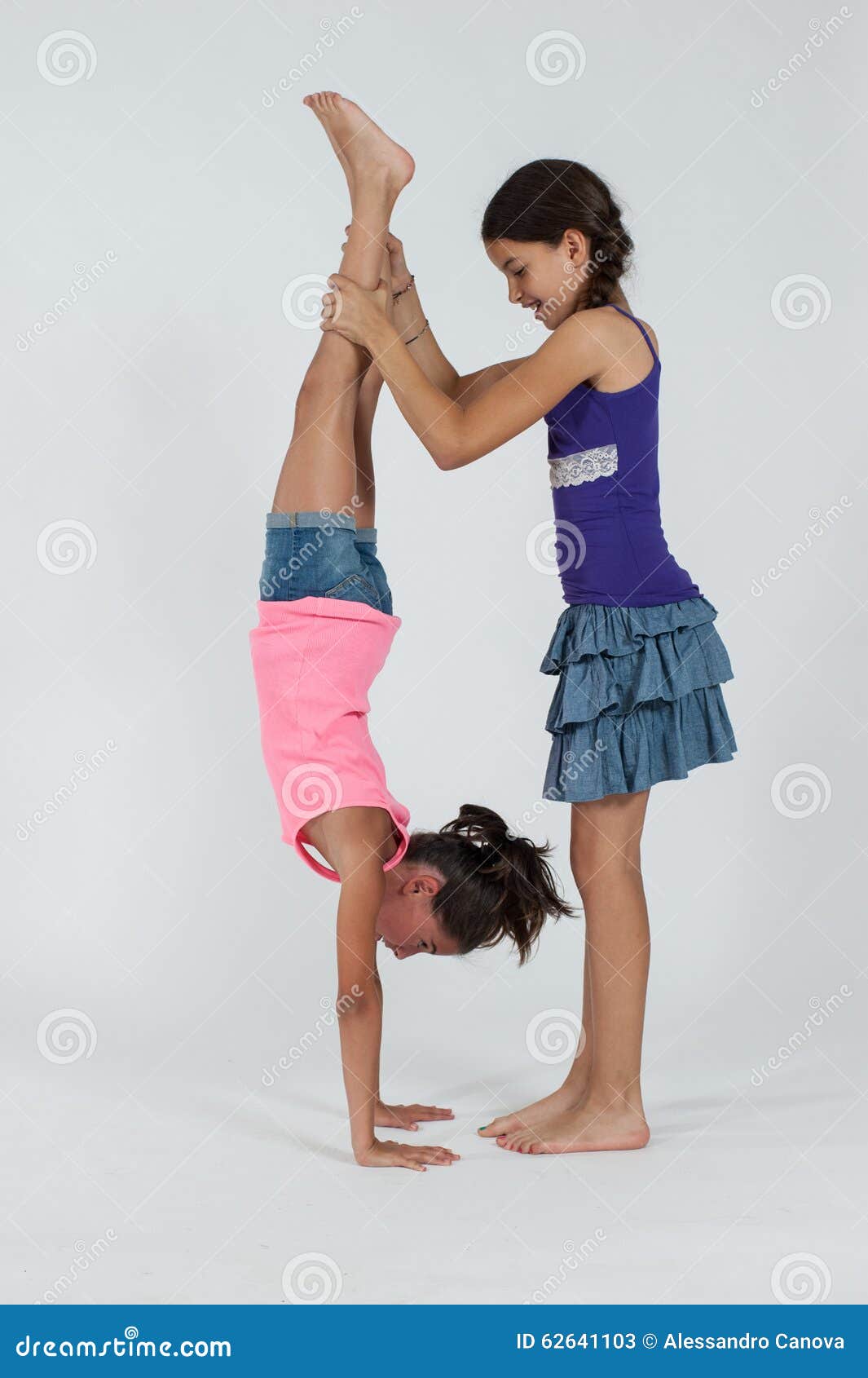 Friends playing handstand stock image. Image of caucasian - 62641103