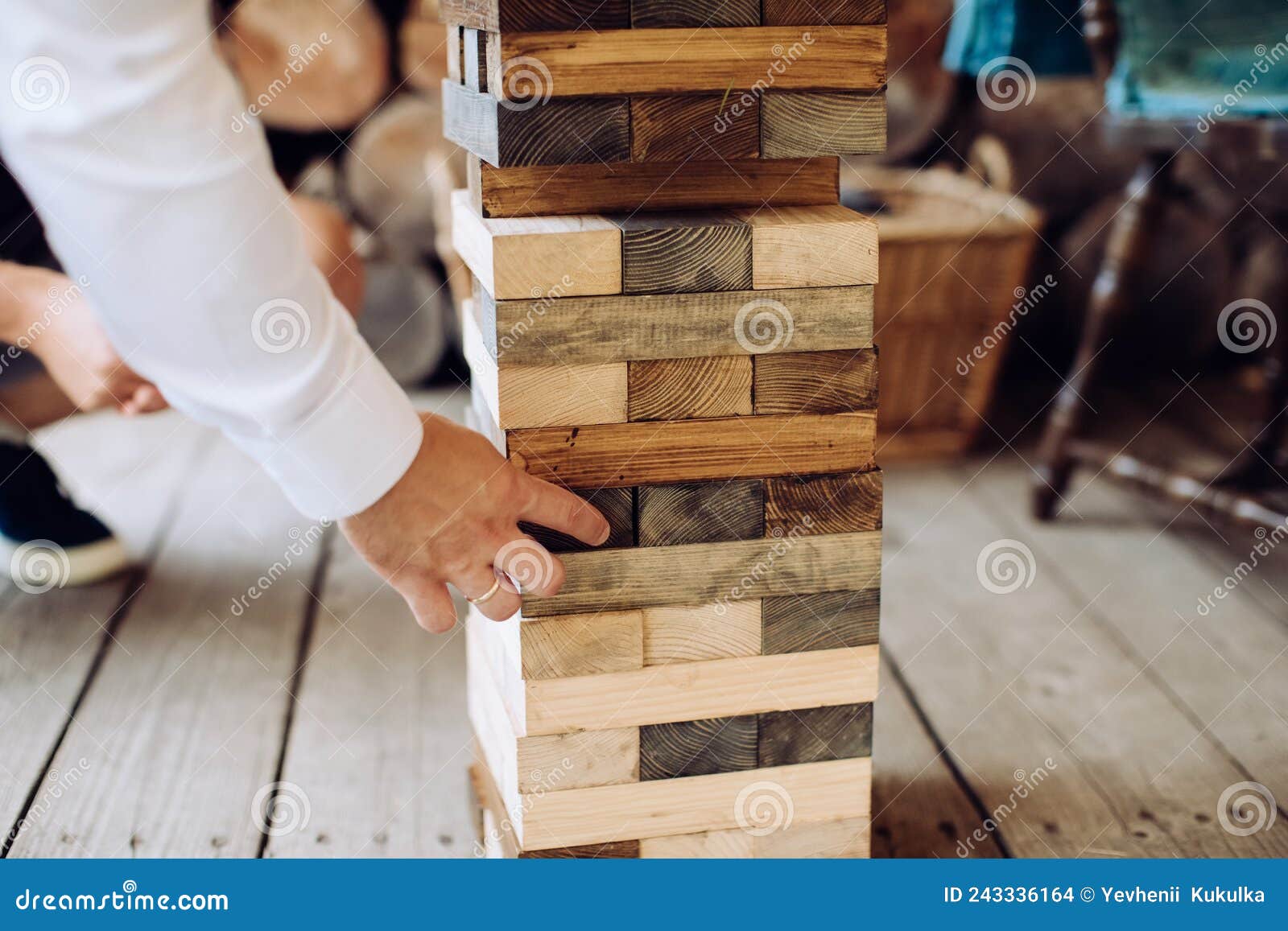 Friends Playing Jenga Game at the Party Stock Photo - Image of wooden ...