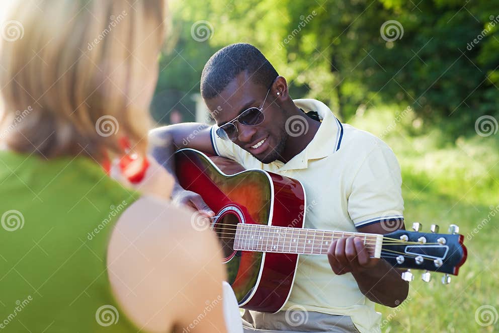 Friends playing music stock image. Image of cheerful, african - 9641381