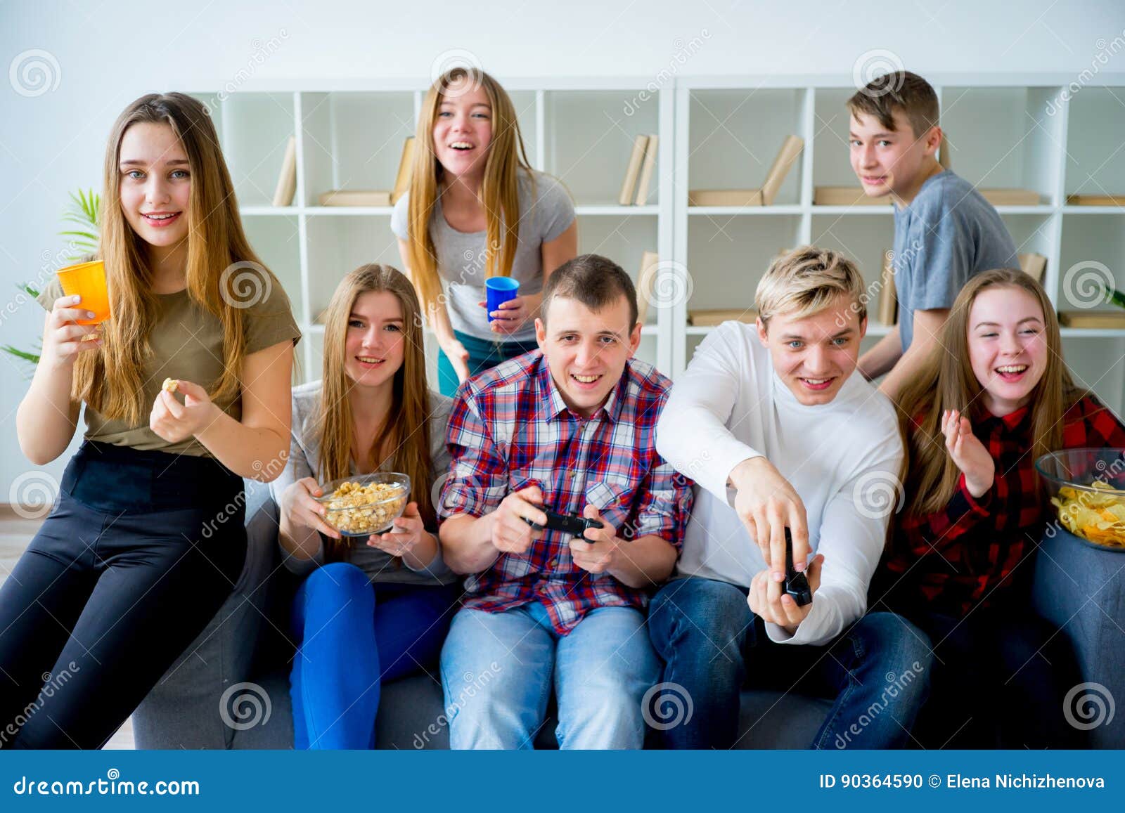 Friends Playing Playstation Stock Photo - Image of concentration ...