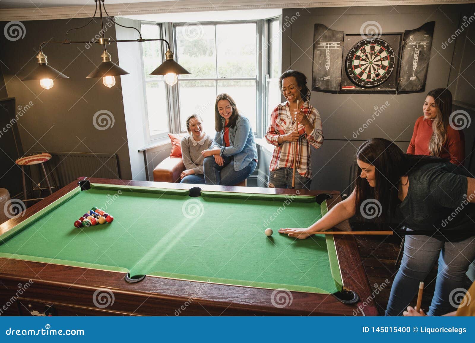 Friends Playing Pool stock photo. Image of mixed, ball - 145015400