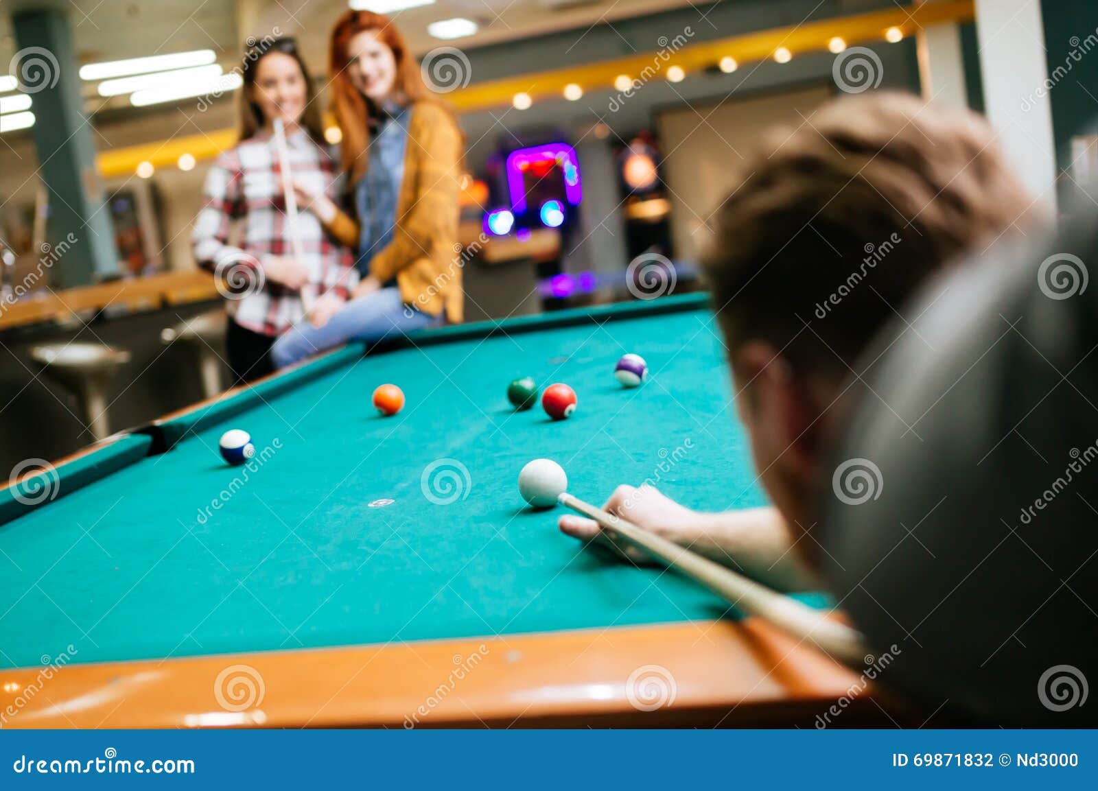 Friends playing snooker stock photo. Image of exercise - 69871832