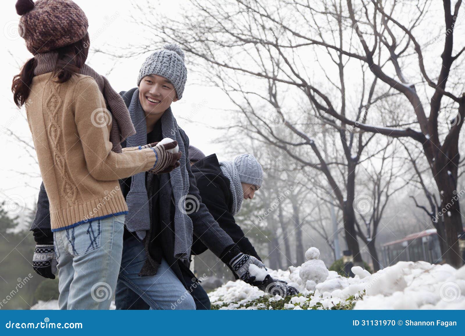 Friends Playing in the Snow, Laughing Stock Photo - Image of outdoors ...