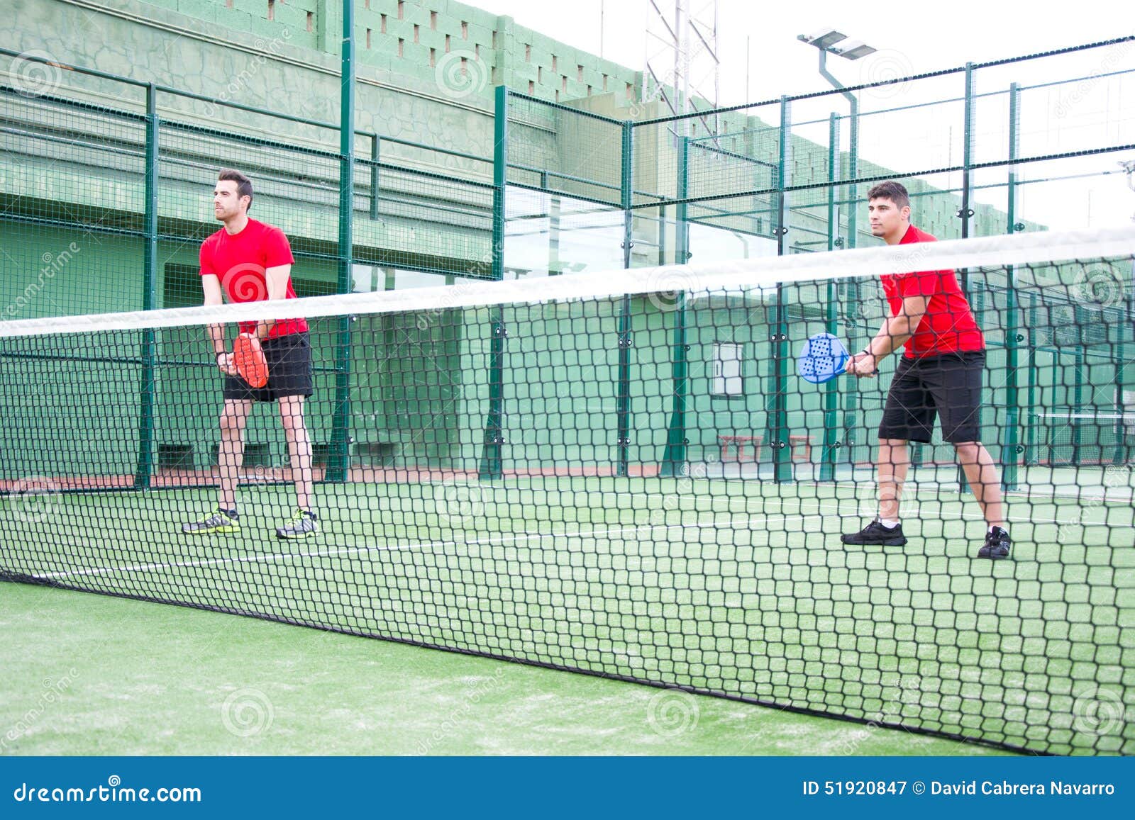 Friends Playing Team Paddle Tennis. Stock Image - Image of male, young ...