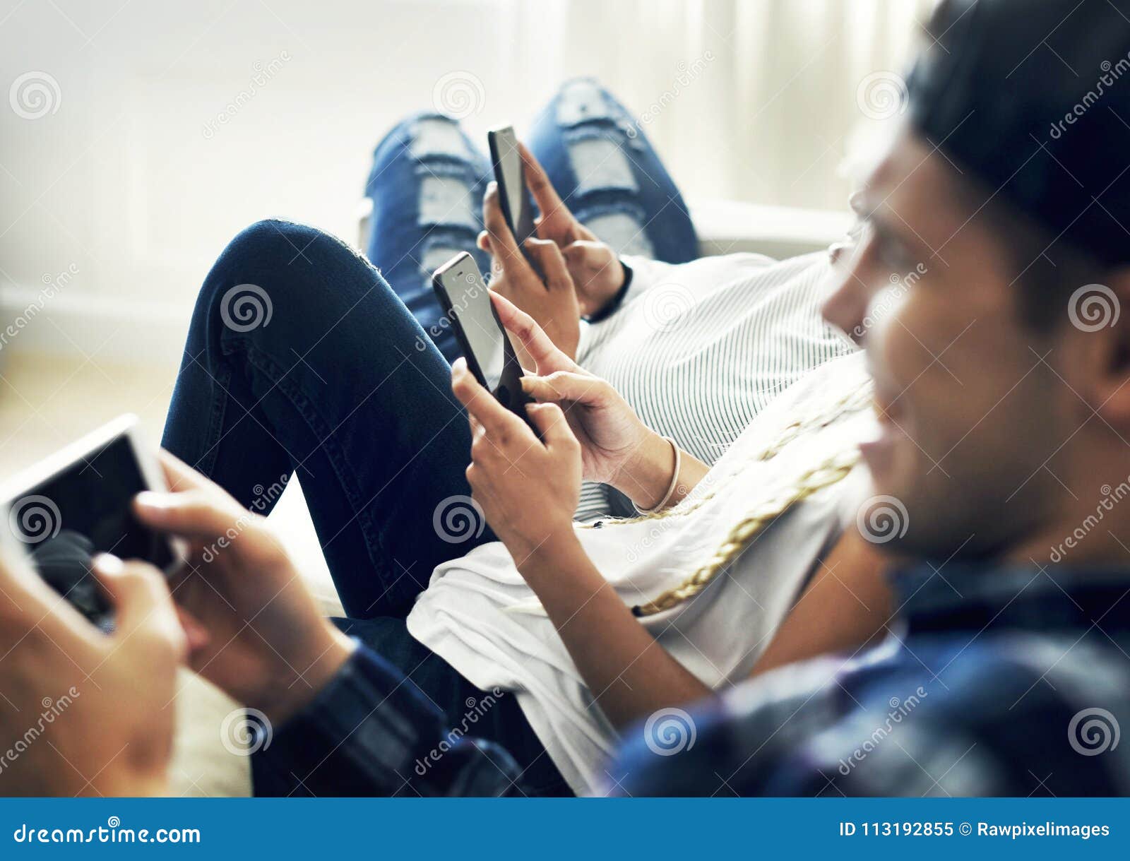 Friends Playing with Their Smartphones Stock Image - Image of adult ...