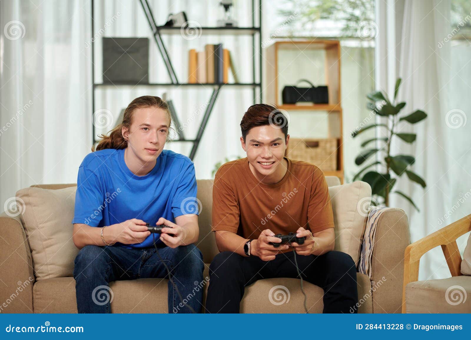 Friends Playing Videogame stock photo. Image of boys - 284413228