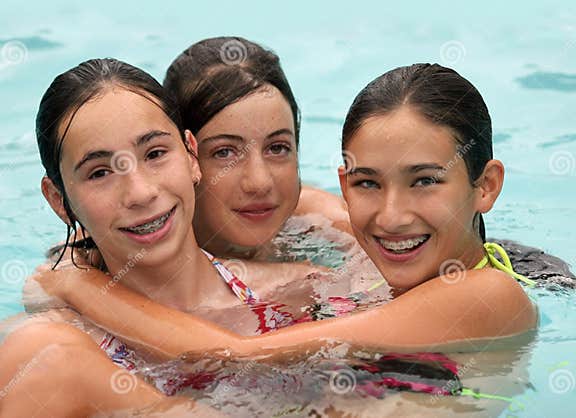 Friends in a pool stock photo. Image of blue, laugh, friend - 1312846