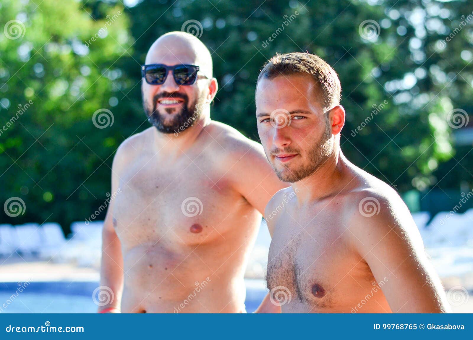 Friends on pool stock image. Image of male, healthy, eyes - 99768765