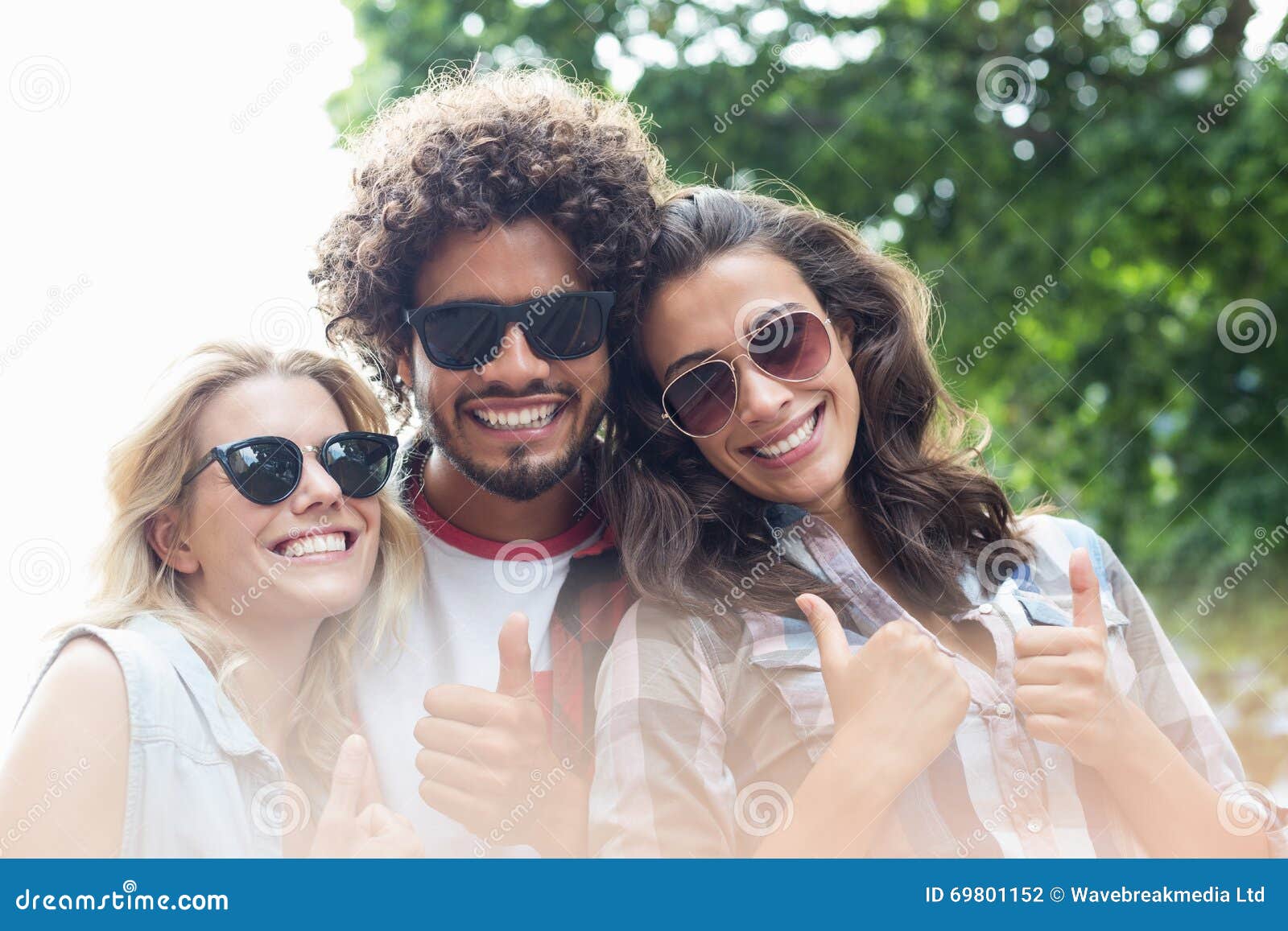 Friends posing at camera stock photo. Image of citylife - 69801152