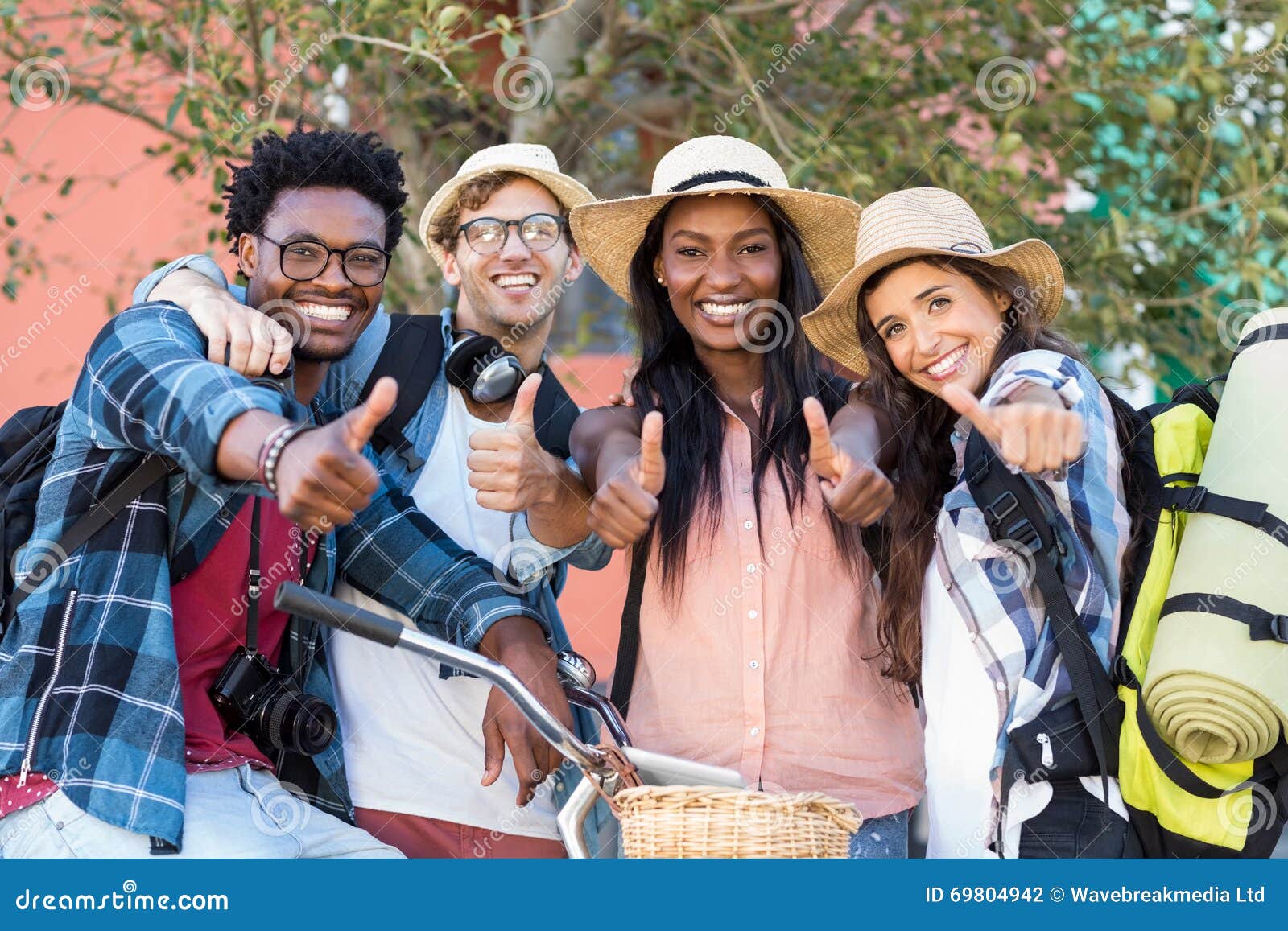 Friends posing at camera stock photo. Image of citylife - 69804942