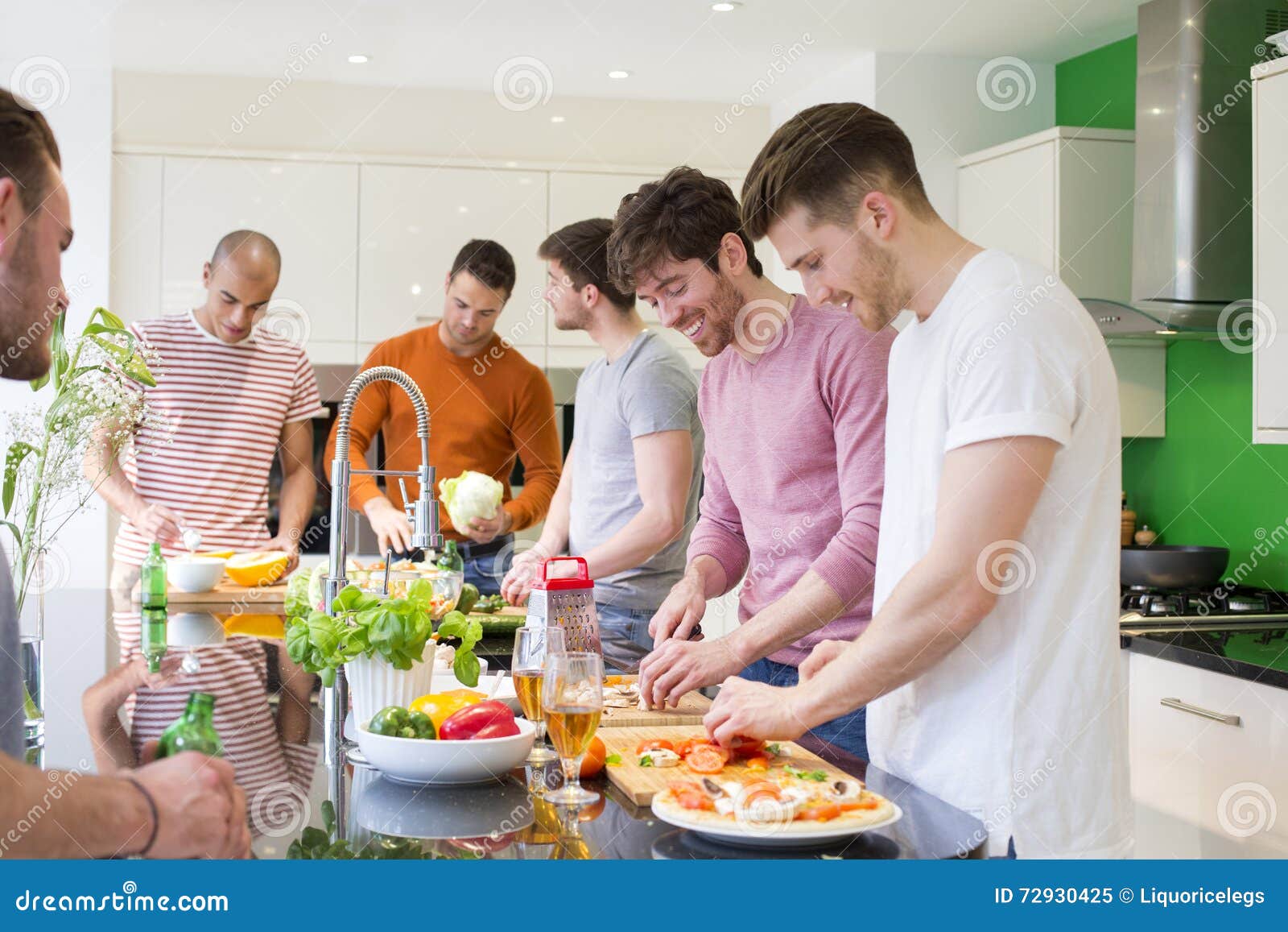 Friends Preparing a Meal stock image. Image of making - 72930425