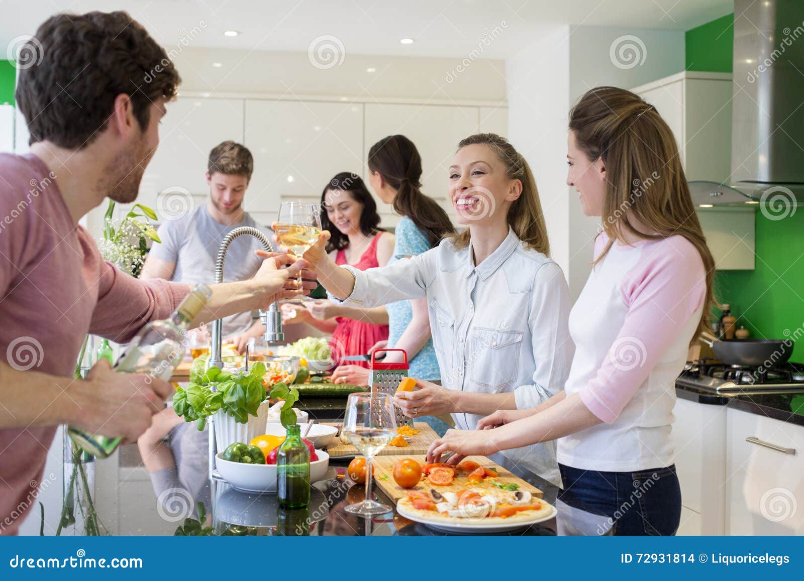 Friends Preparing a Meal stock photo. Image of open, couple - 72931814