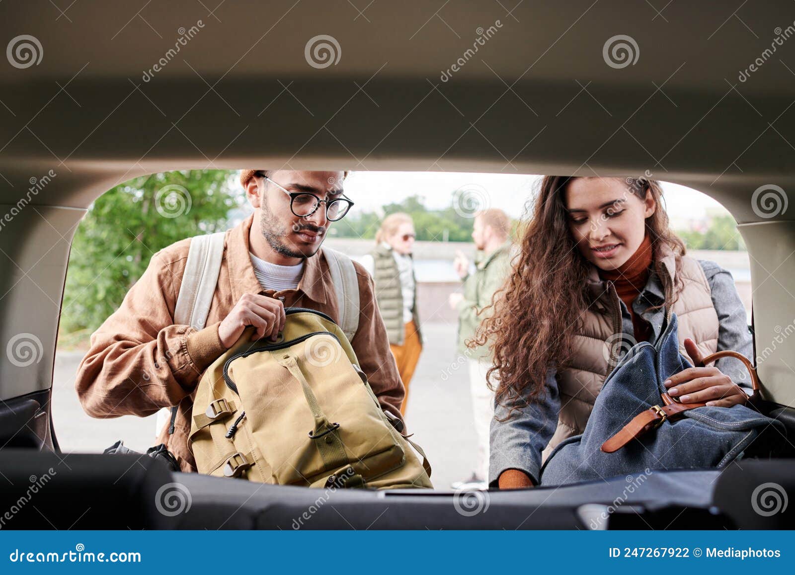 Friends Preparing for Travel Stock Photo - Image of outdoors, smiling ...