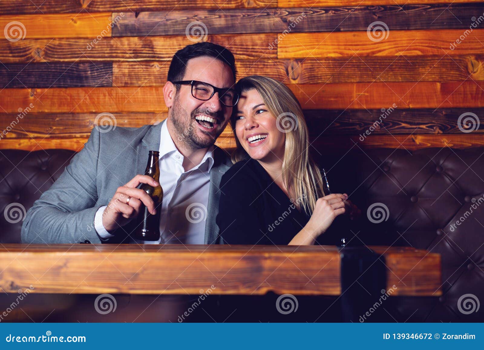 Friends in the Pub. Drinking Beer, Talking, Having Fun Stock Photo ...