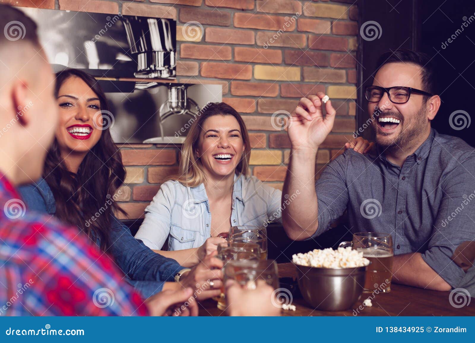 Friends in the Pub. Drinking Beer, Talking, Having Fun Stock Image ...