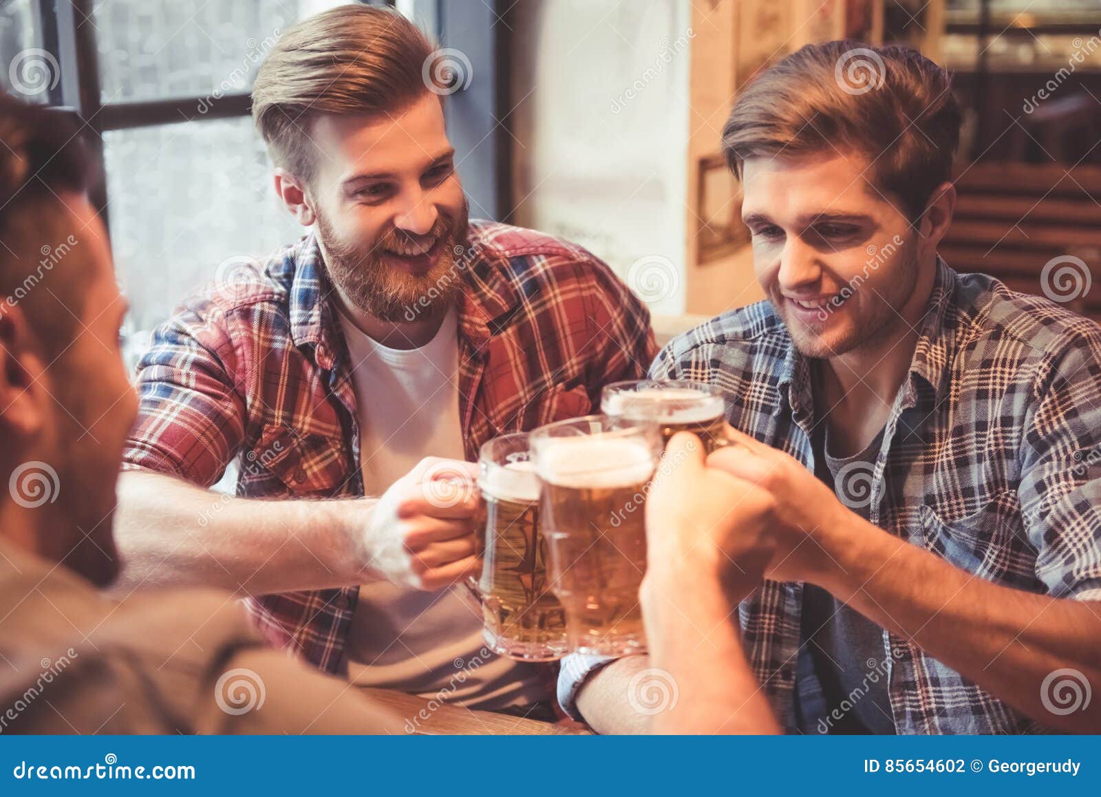 Friends at the pub stock photo. Image of adult, brewery - 85654602