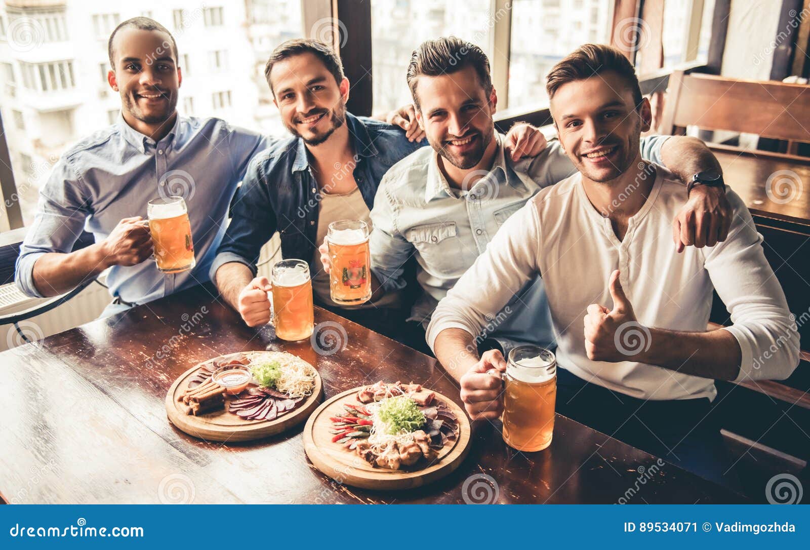 Friends in pub stock image. Image of handsome, communication - 89534071