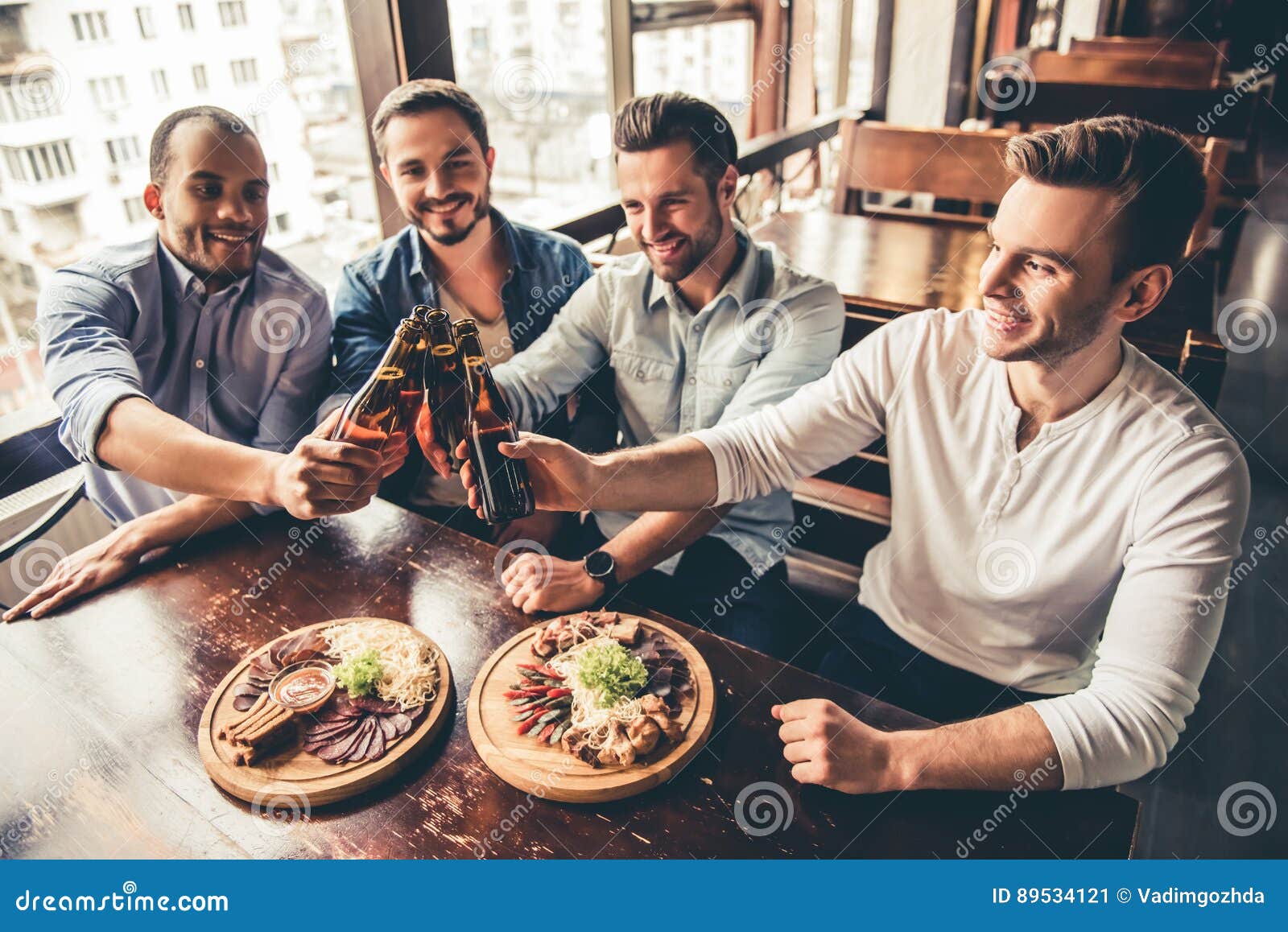 Friends in pub stock image. Image of communication, cheerful - 89534121