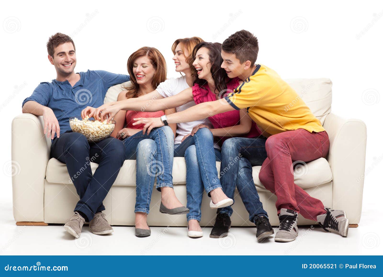 Friends Reaching for the Popcorn Stock Image - Image of funny, couch ...