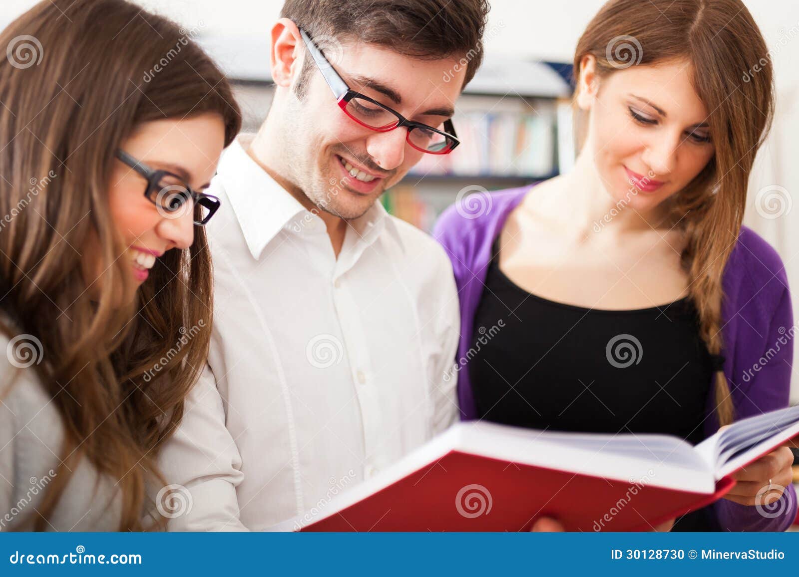 Friends reading a book stock photo. Image of bookstore - 30128730