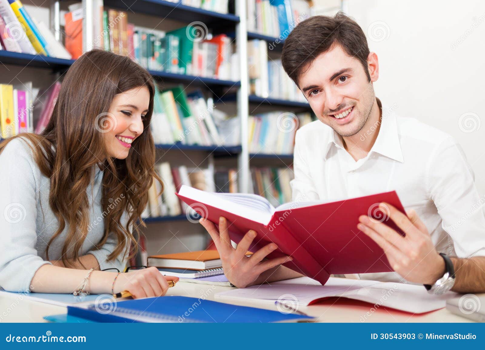 Friends reading a book stock image. Image of graduate - 30543903