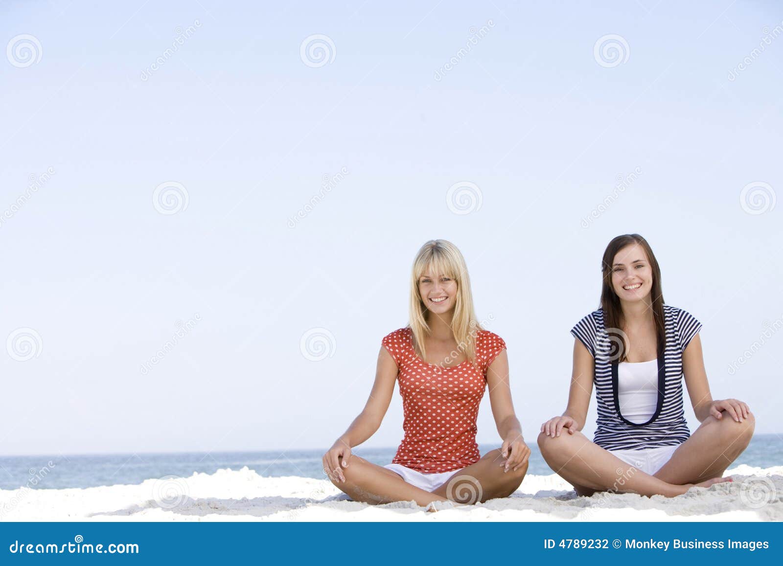 Friends relaxing on beach stock photo. Image of people - 4789232