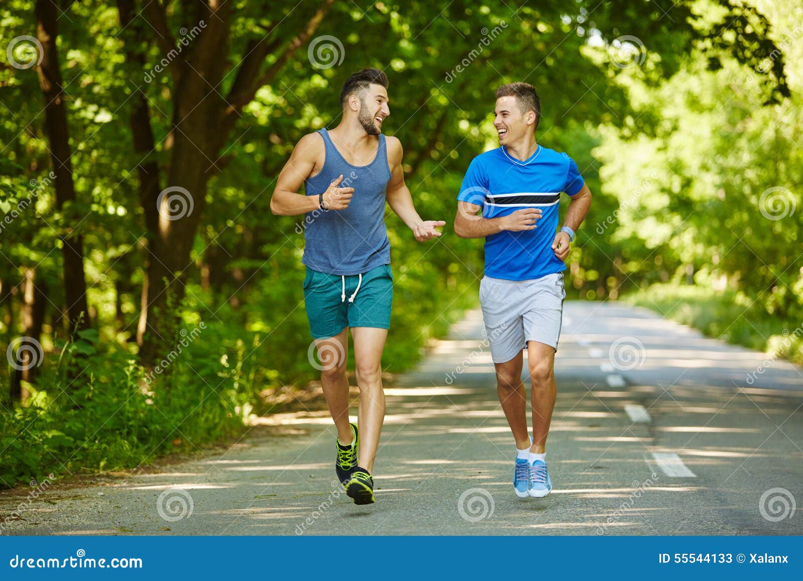 Friends Running through Forest Stock Image - Image of lifestyle, health ...