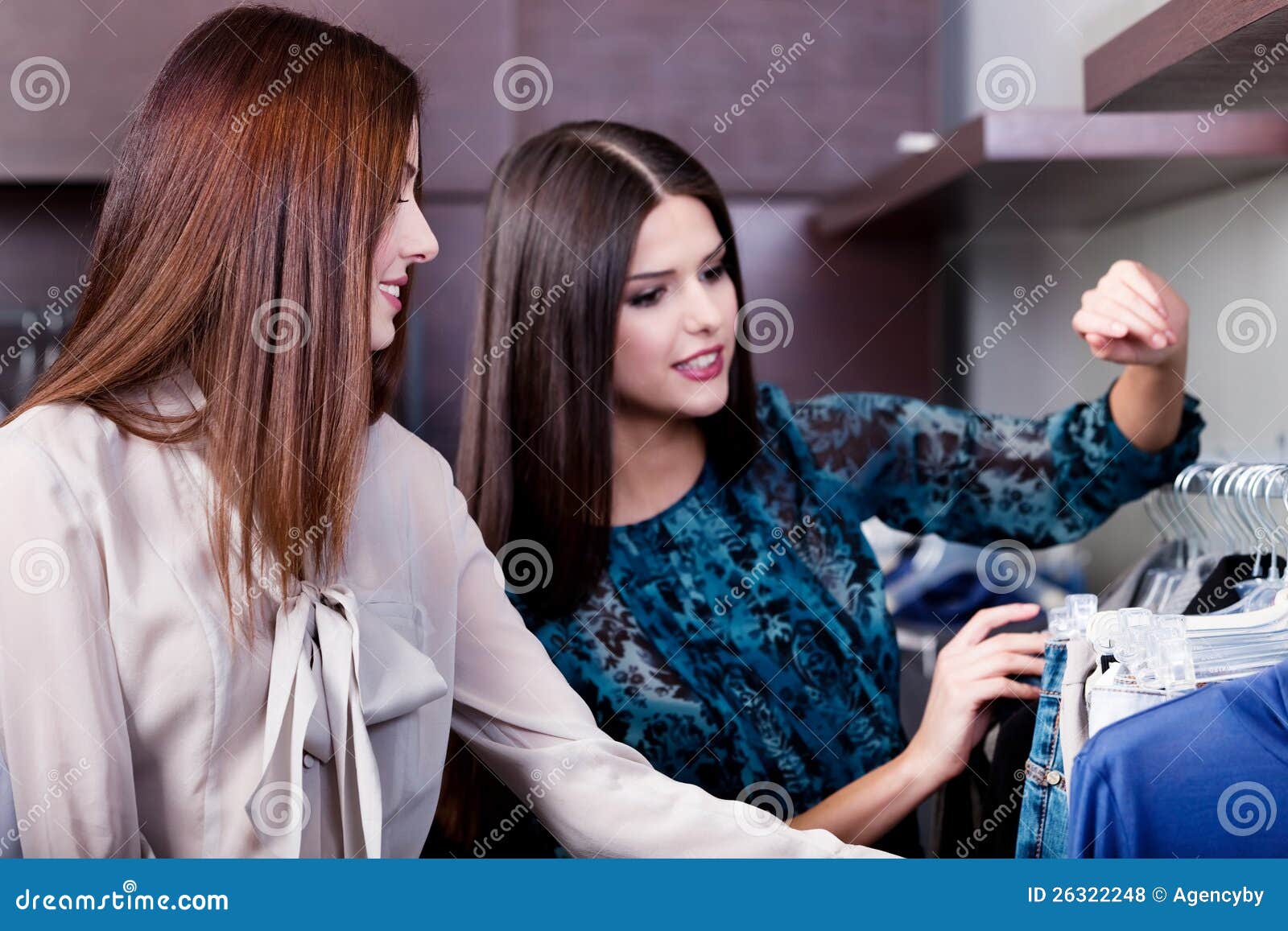 Friends are Searching for Clothes Stock Photo - Image of color, brown ...