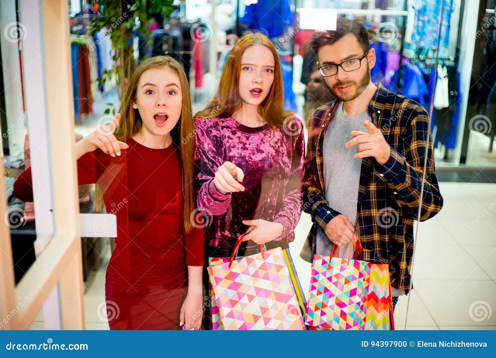 Friends shopping in mall stock photo. Image of happy - 94397900