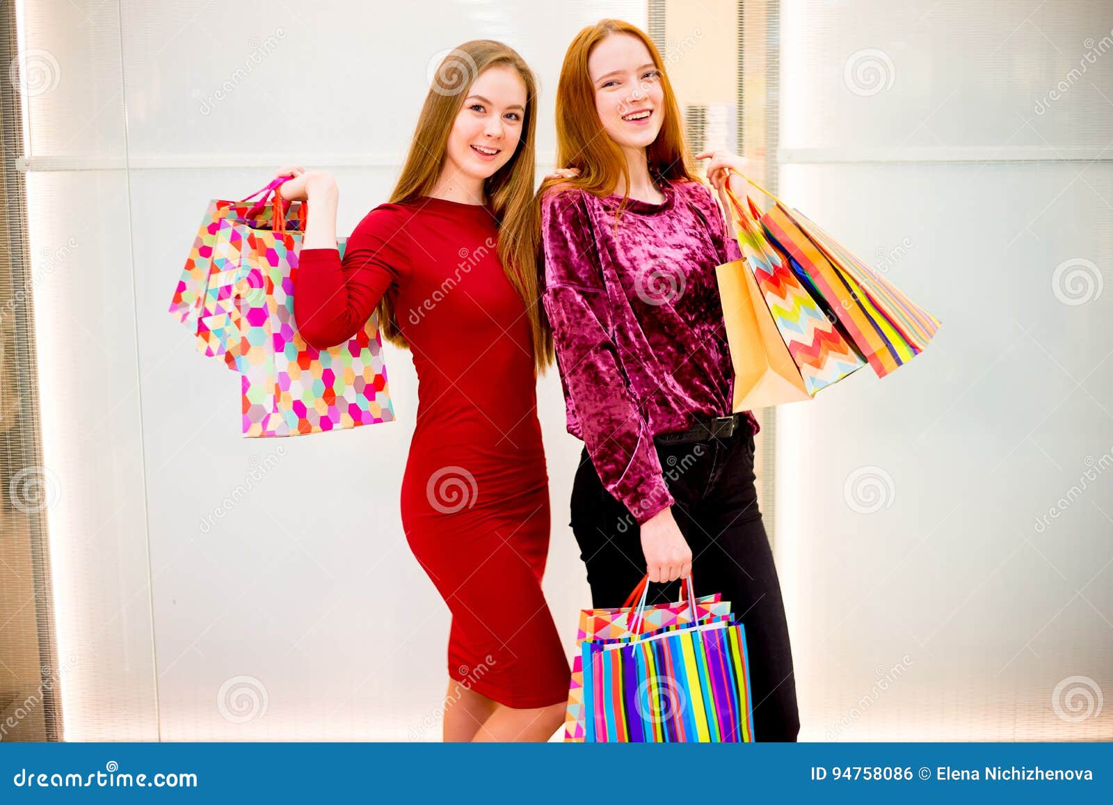 Friends shopping in mall stock photo. Image of buyer - 94758086