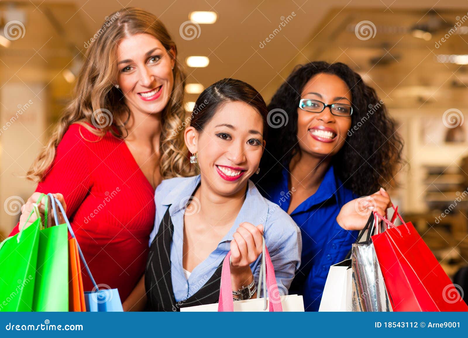 Friends Shopping with Presents in Mall Stock Photo - Image of caucasian ...