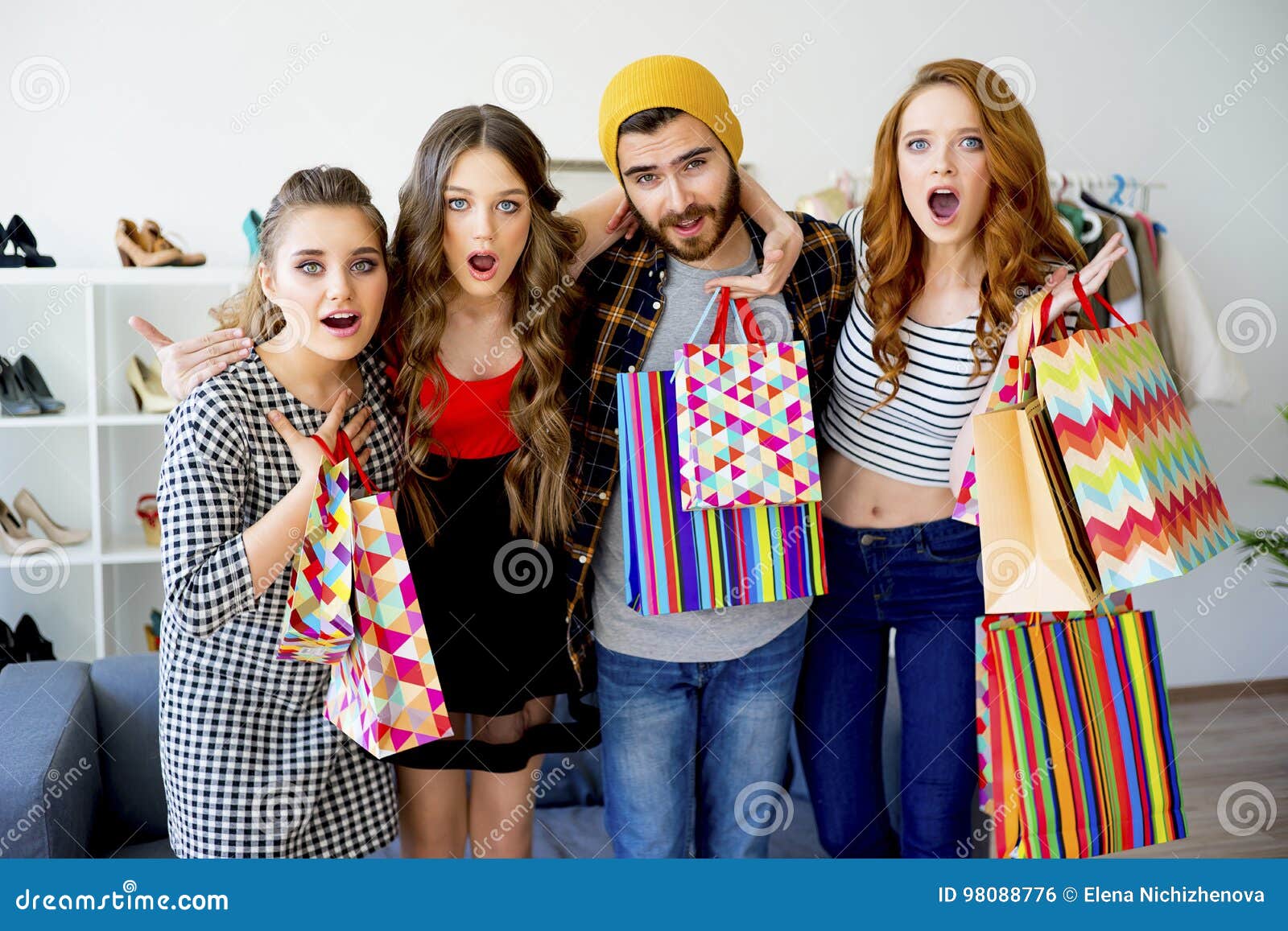 Friends shopping together stock photo. Image of group - 98088776