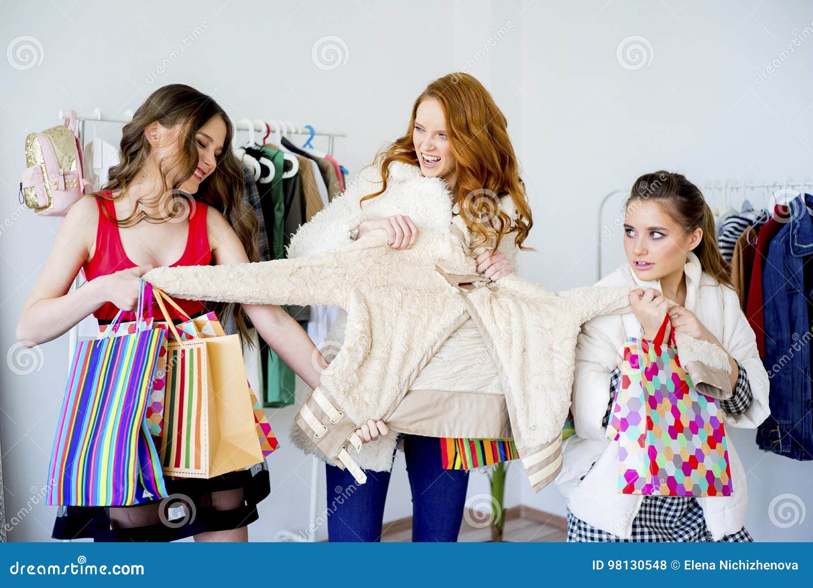 Friends shopping together stock photo. Image of standing - 98130548