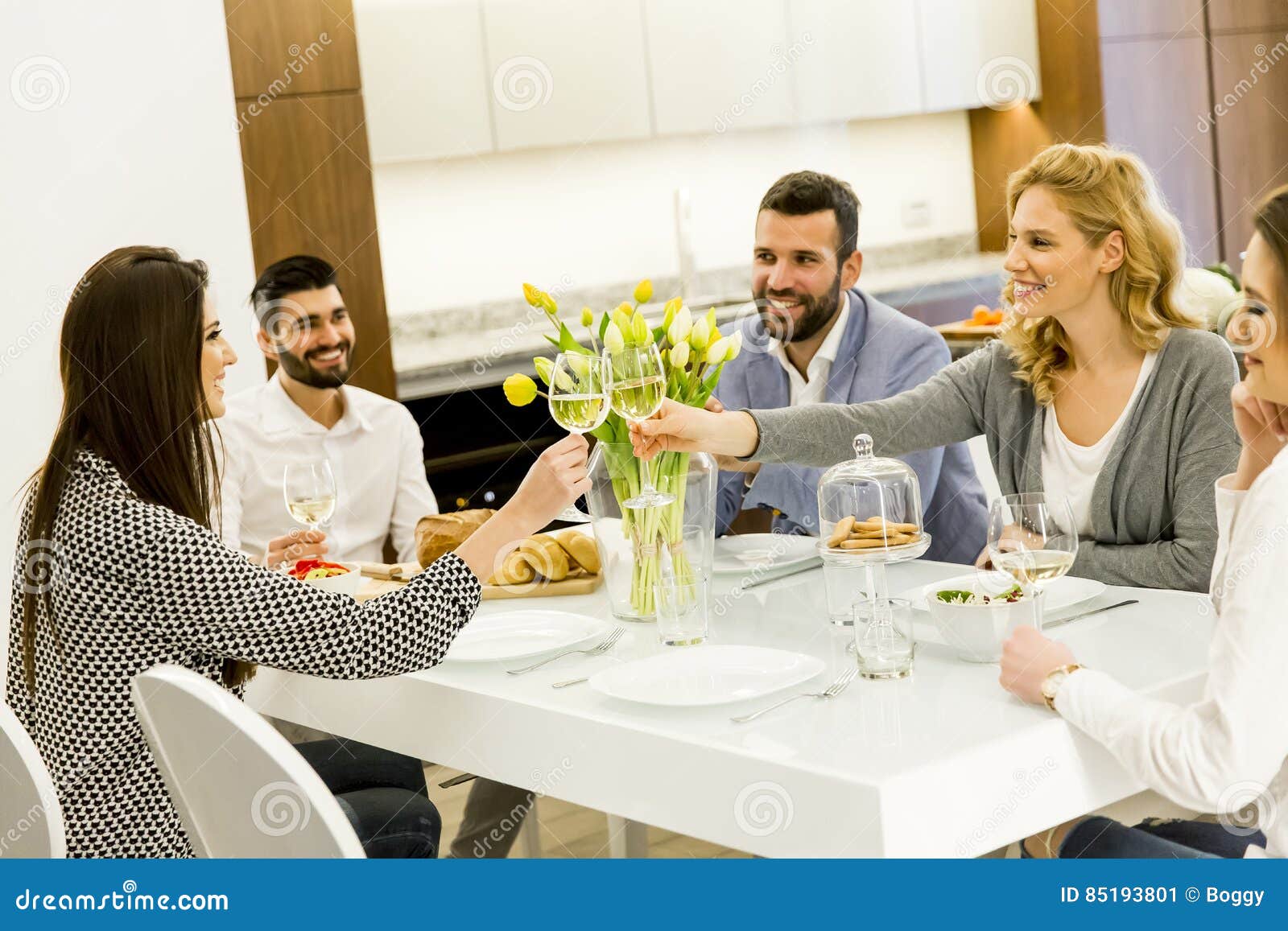 Friends Sitting at a Dining Table Stock Image - Image of enjoyment ...