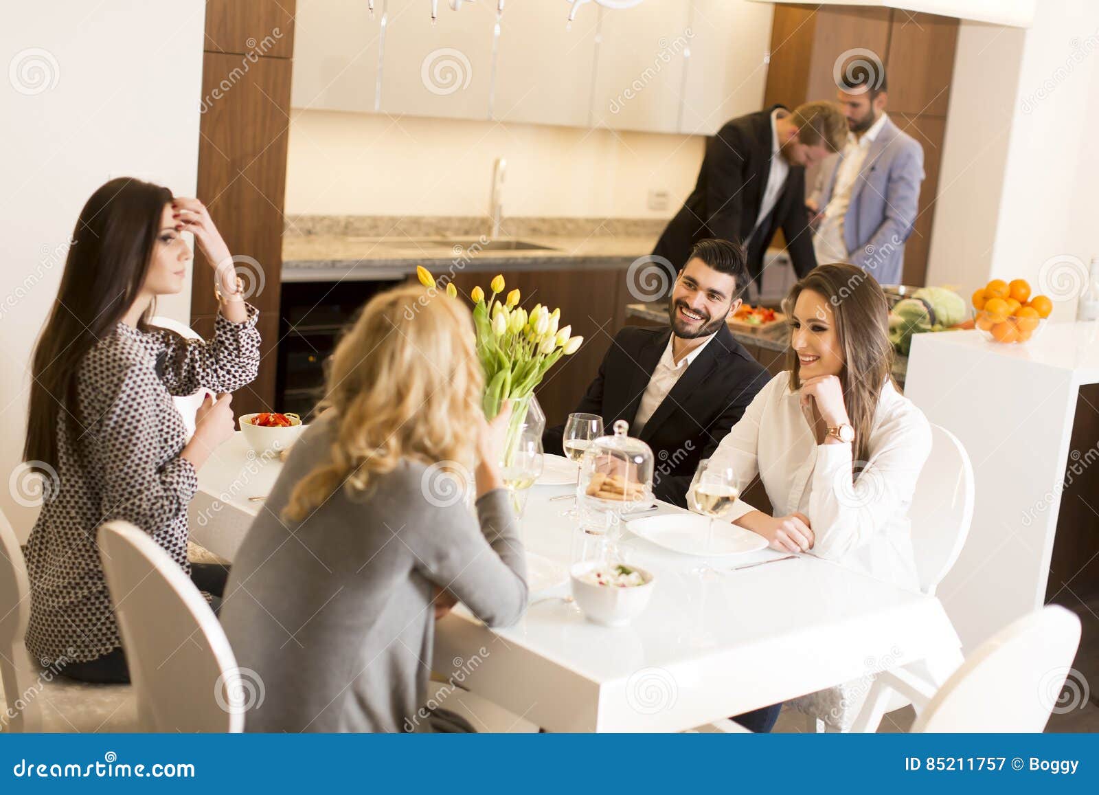 Friends Sitting at a Dining Table Stock Image - Image of sitting ...
