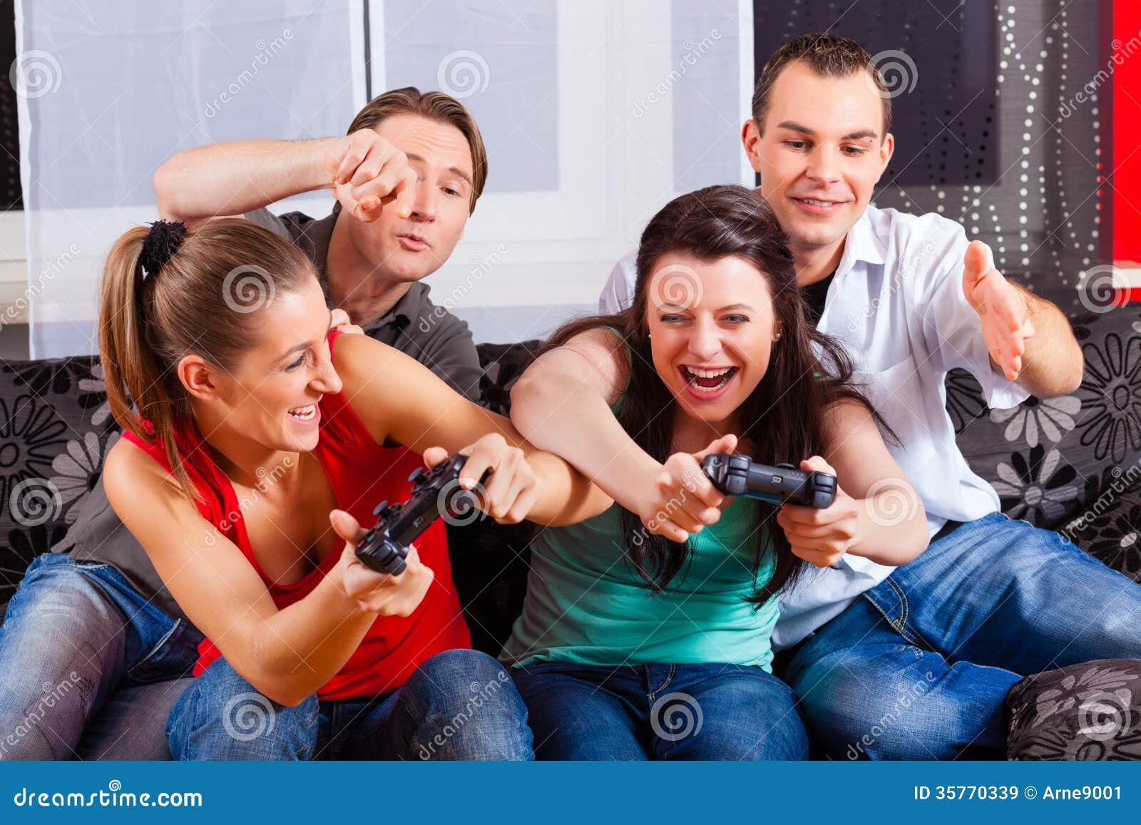 Friends Sitting in Front of Game Console Box Stock Image - Image of ...
