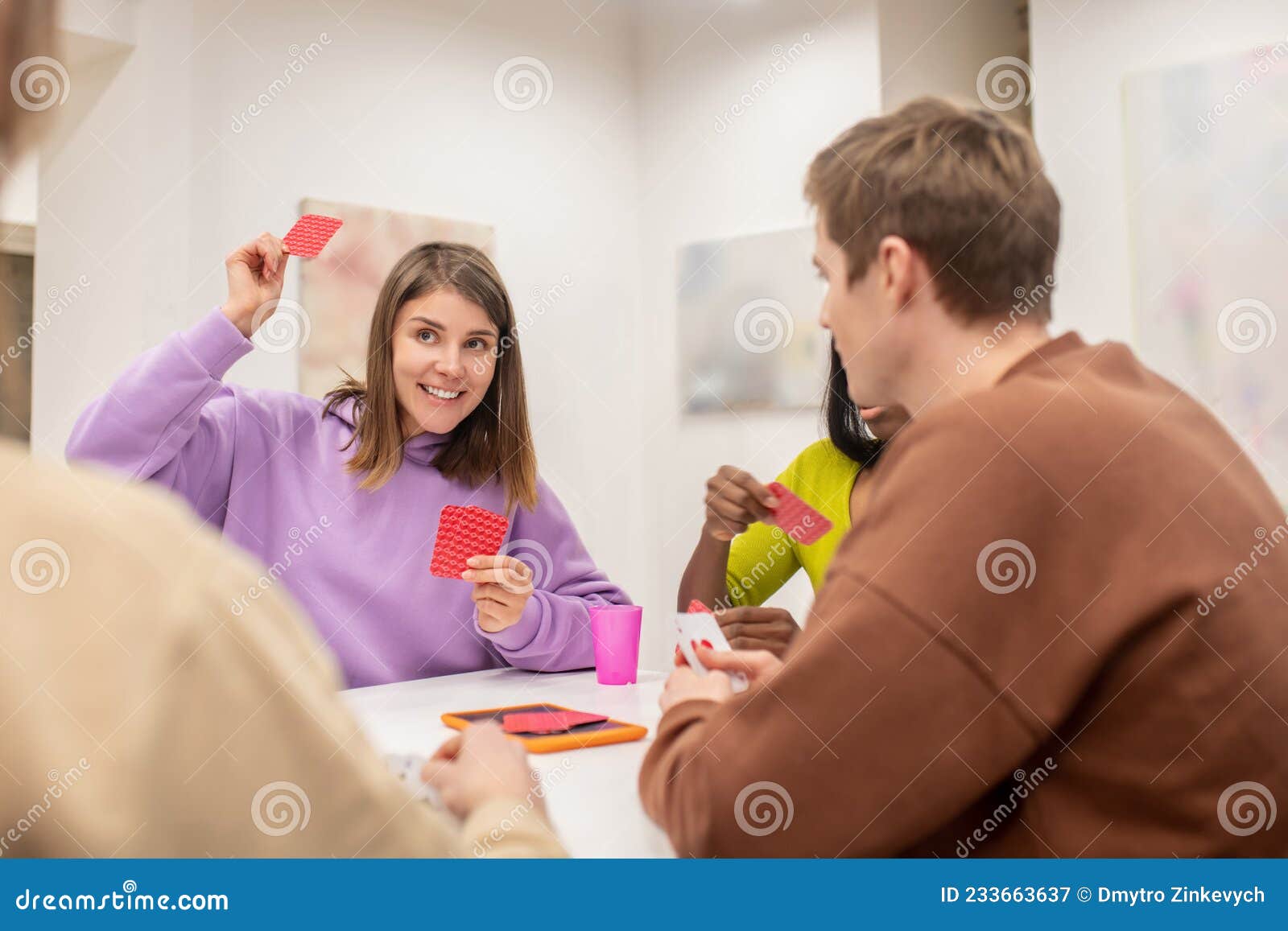 Friends Sitting at the Table and Playing Cards Stock Image - Image of ...
