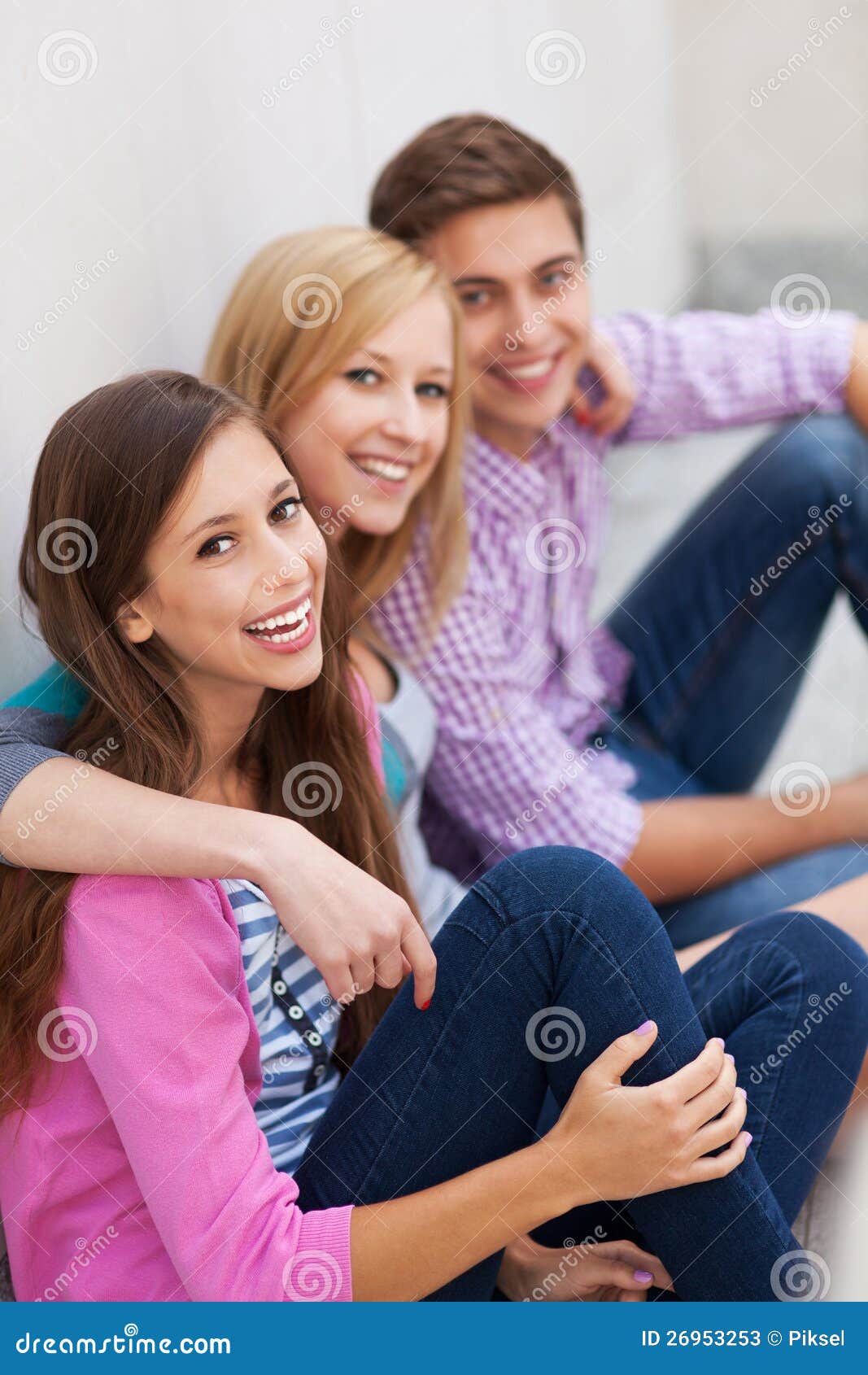Friends sitting together stock image. Image of casual - 26953253