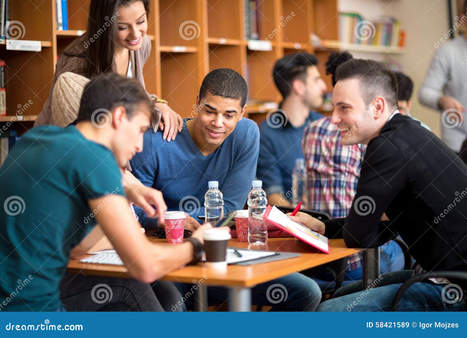 Friends Socializing and Studying Together for Exam Stock Image - Image ...