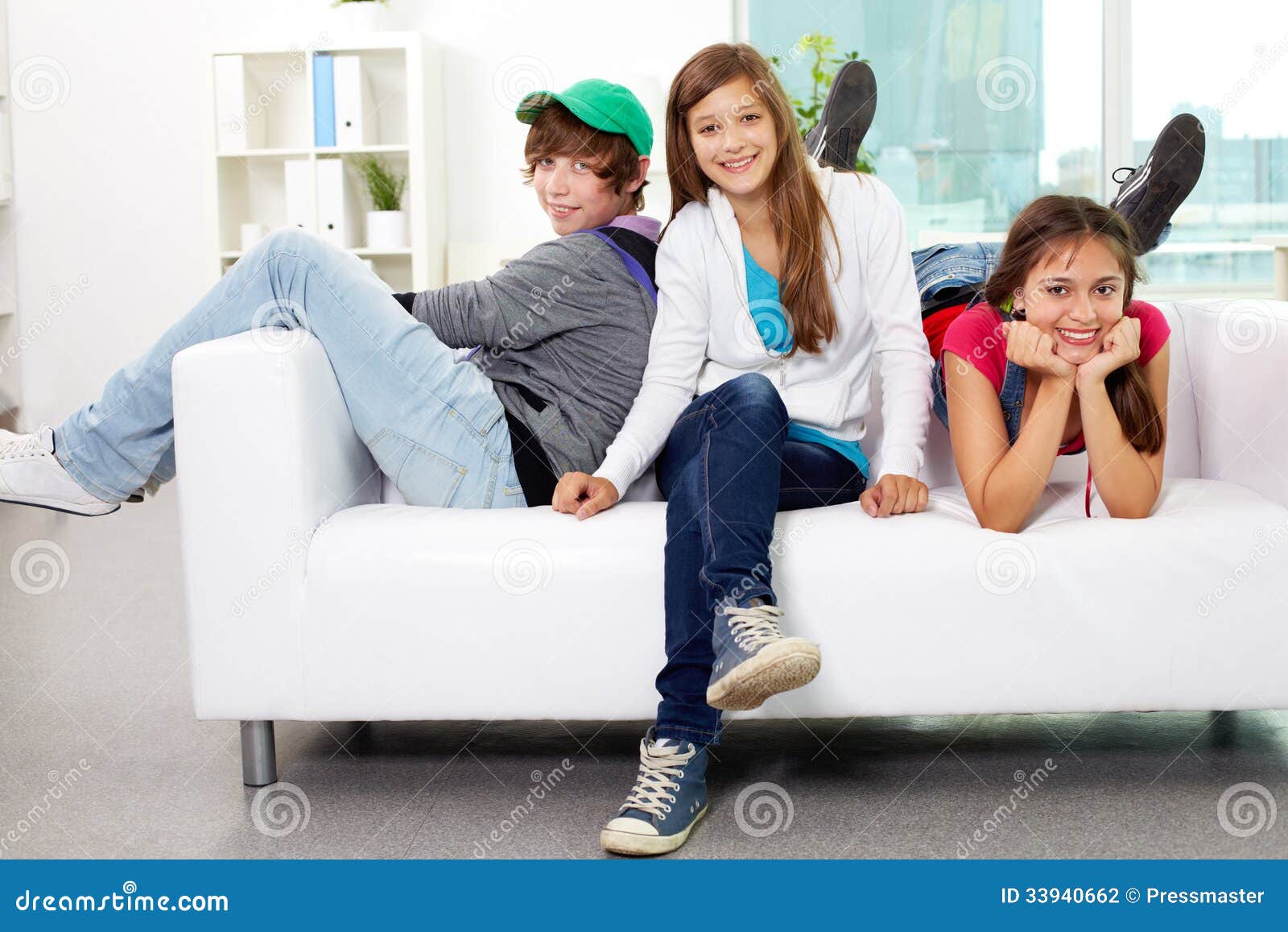 Friends on sofa stock photo. Image of positive, adolescent - 33940662