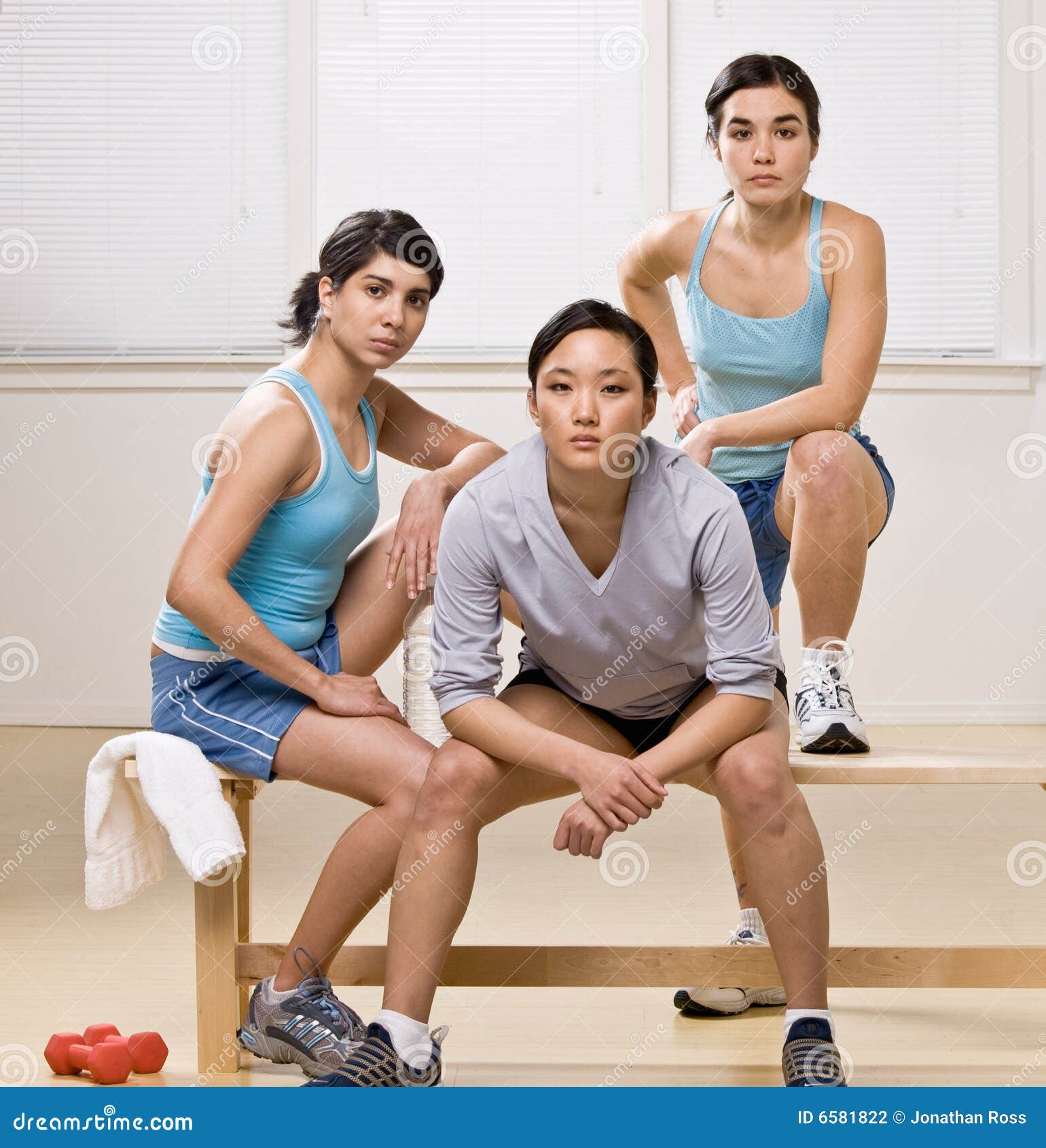Friends in Sportswear Sitting on Bench Stock Photo - Image of clothes ...