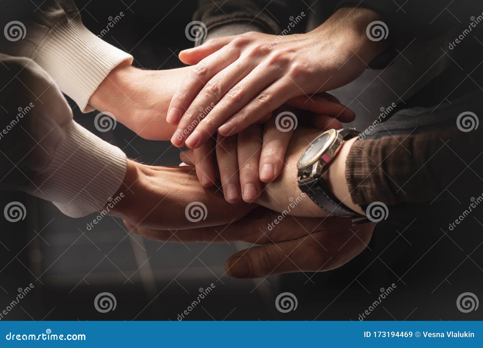 Friends with Stack of Hands Showing Unity and Teamwork Stock Image ...