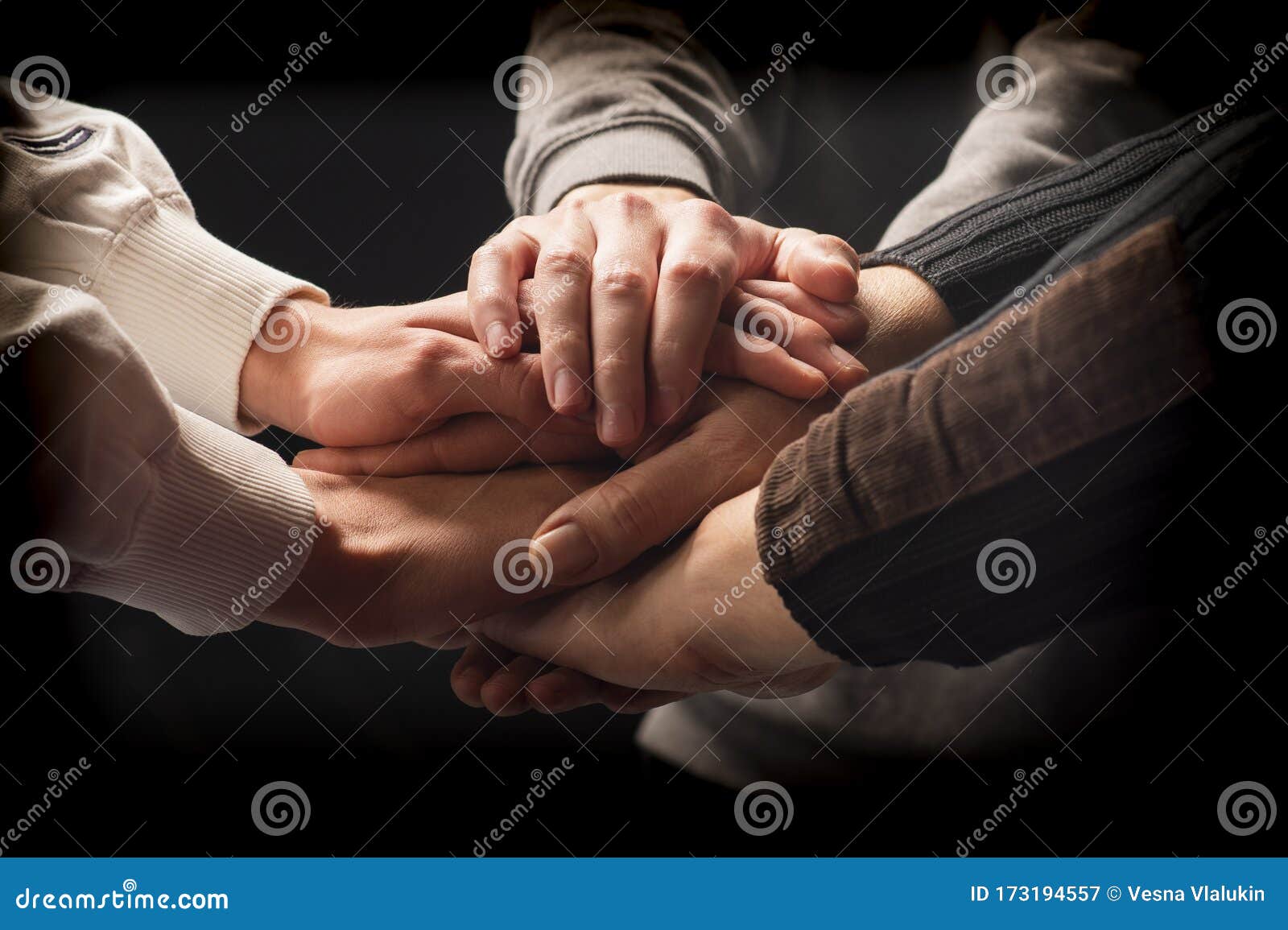 Friends With Stack Of Hands Showing Unity And Teamwork Royalty-Free ...
