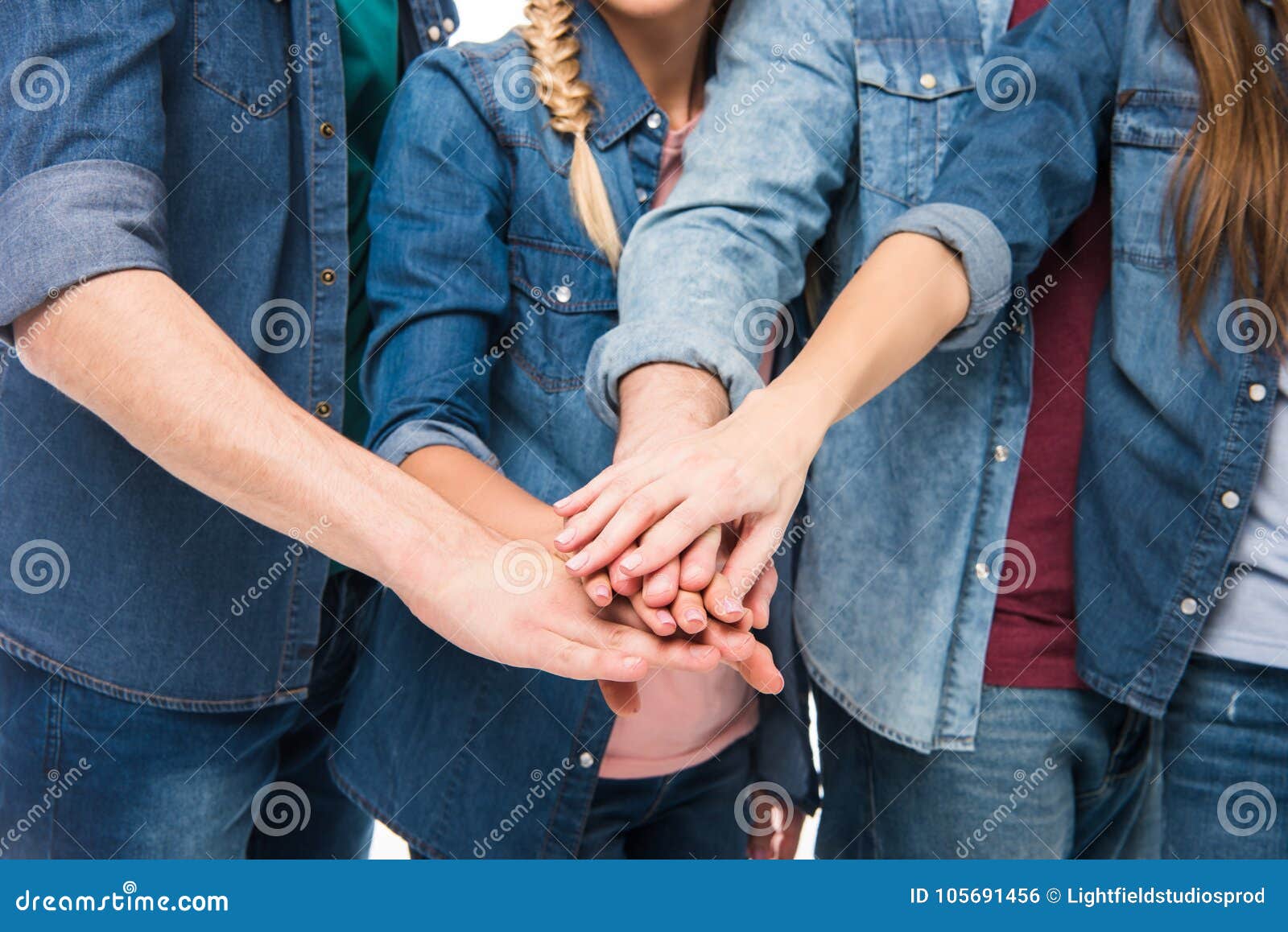 Friends stacking hands stock photo. Image of friendship - 105691456