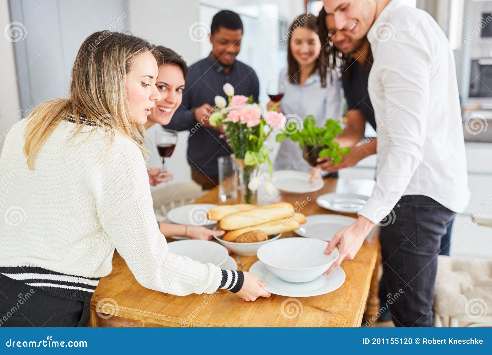 Friends in Student Shared Flat Set Dining Table for Meal Stock Photo ...